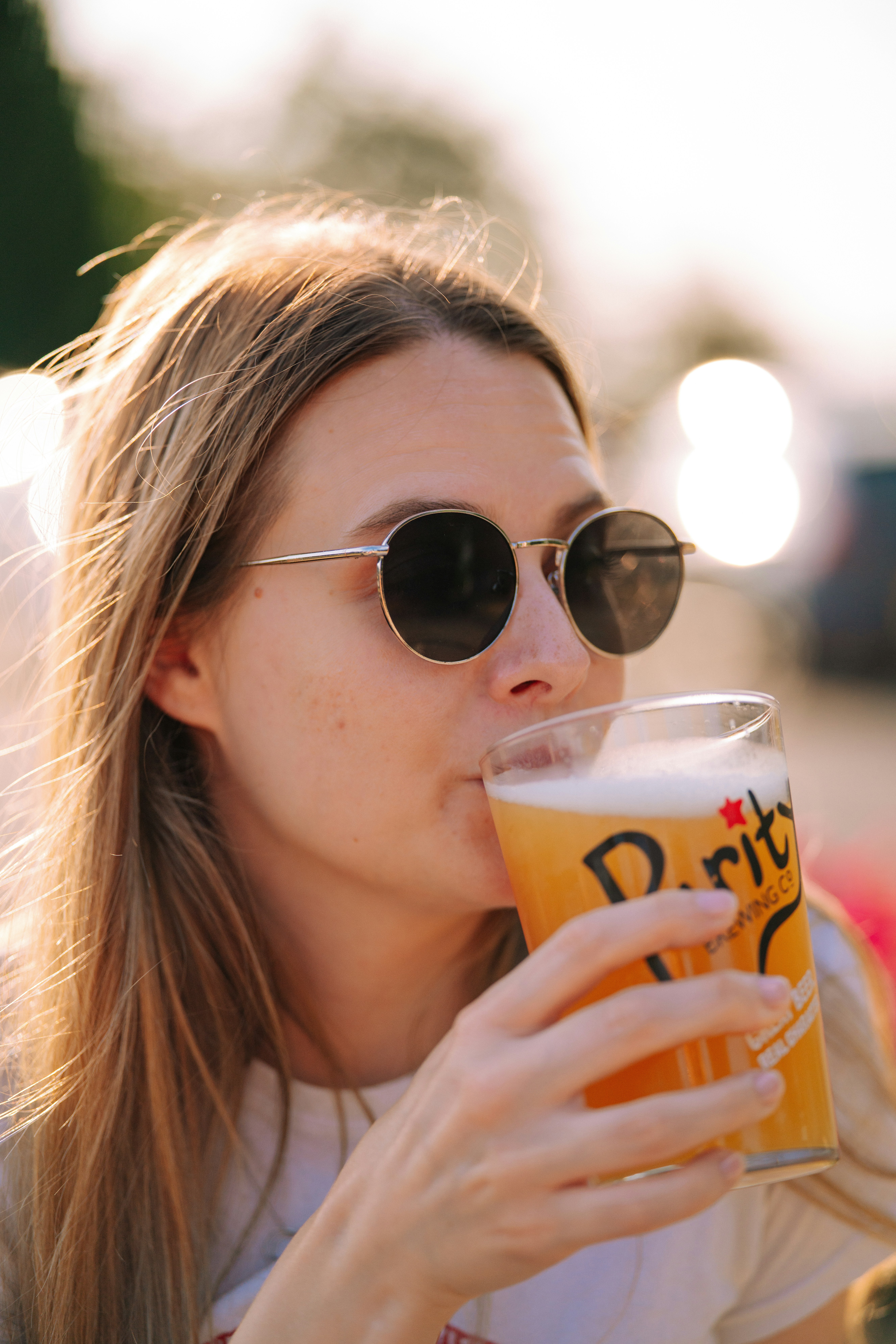 Sunlit Sips: A Glass of Golden Cheer
