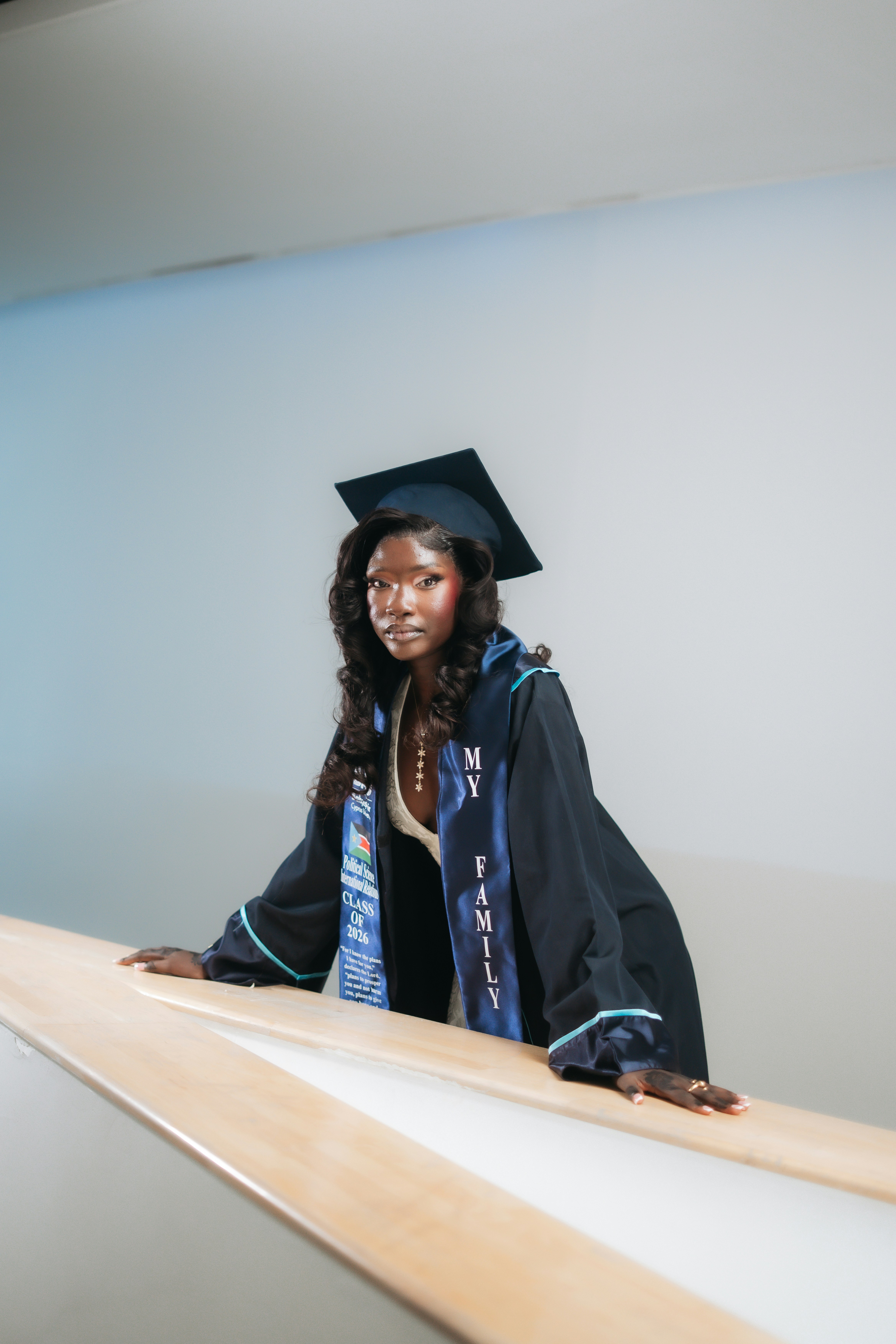 Graduation Glow: A Moment at the Rail