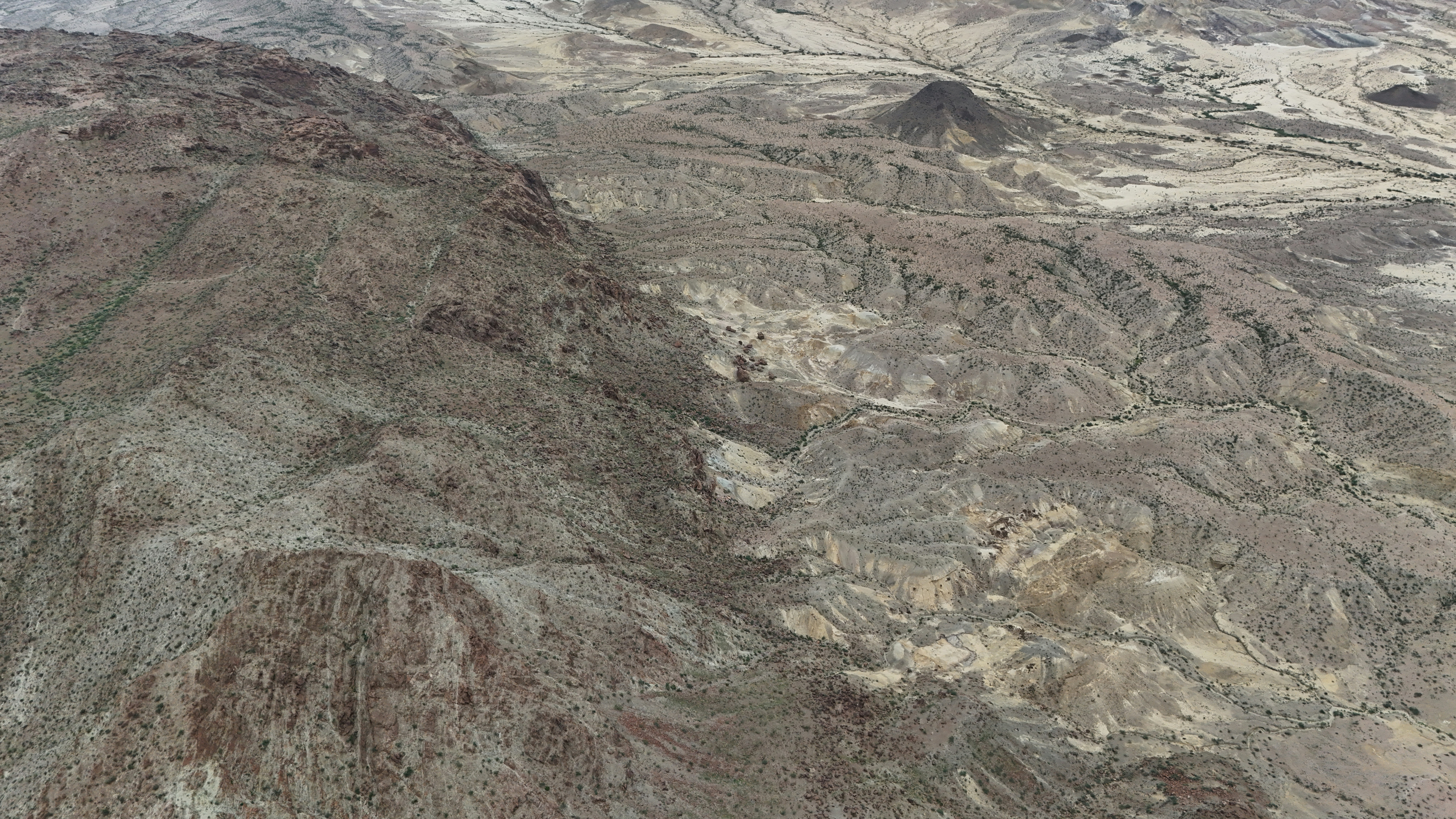 Desert Carved by Time: Aerial Strata in Dry Badlands