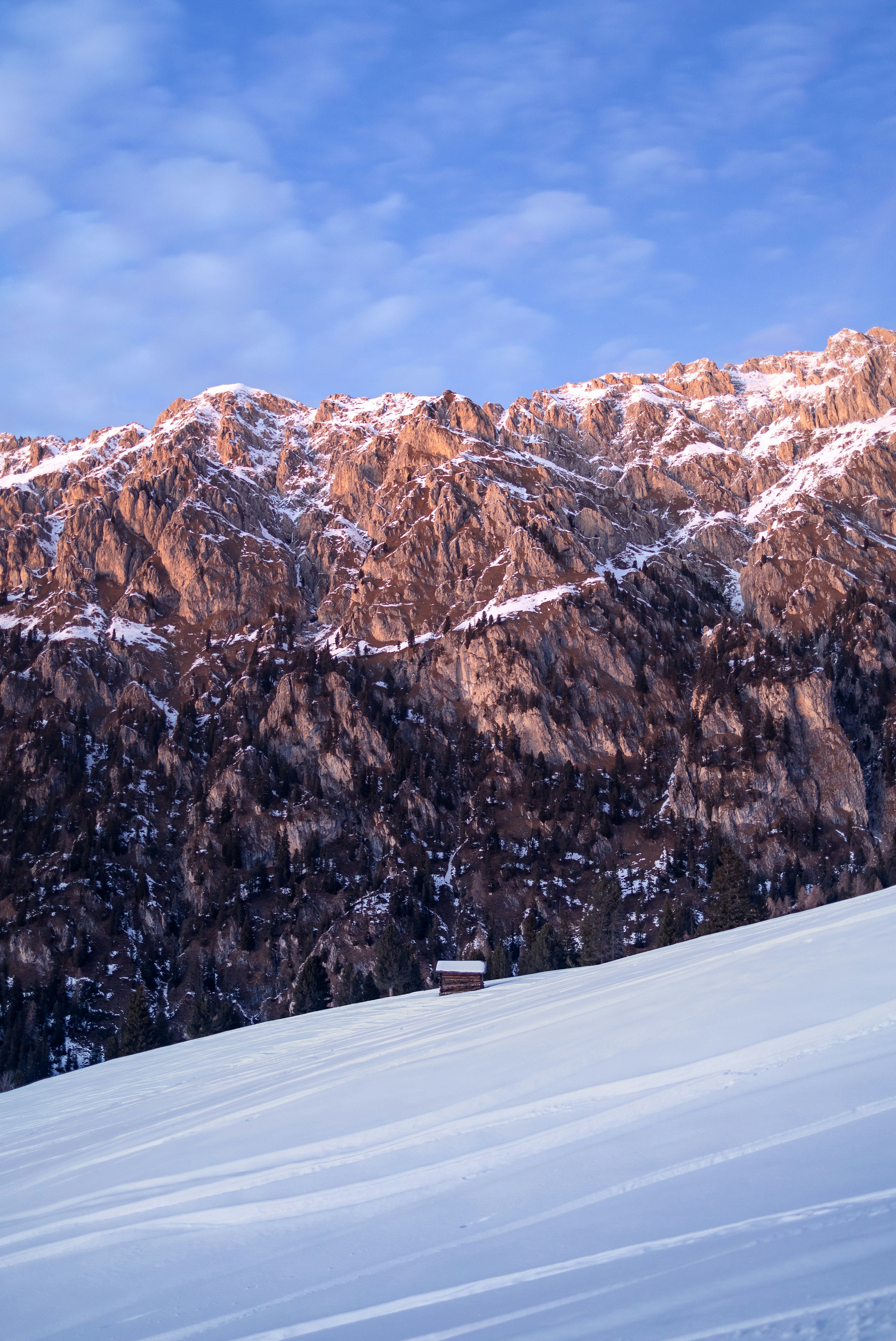 Sunlit Ridge: Snow, Stone, and Sky
