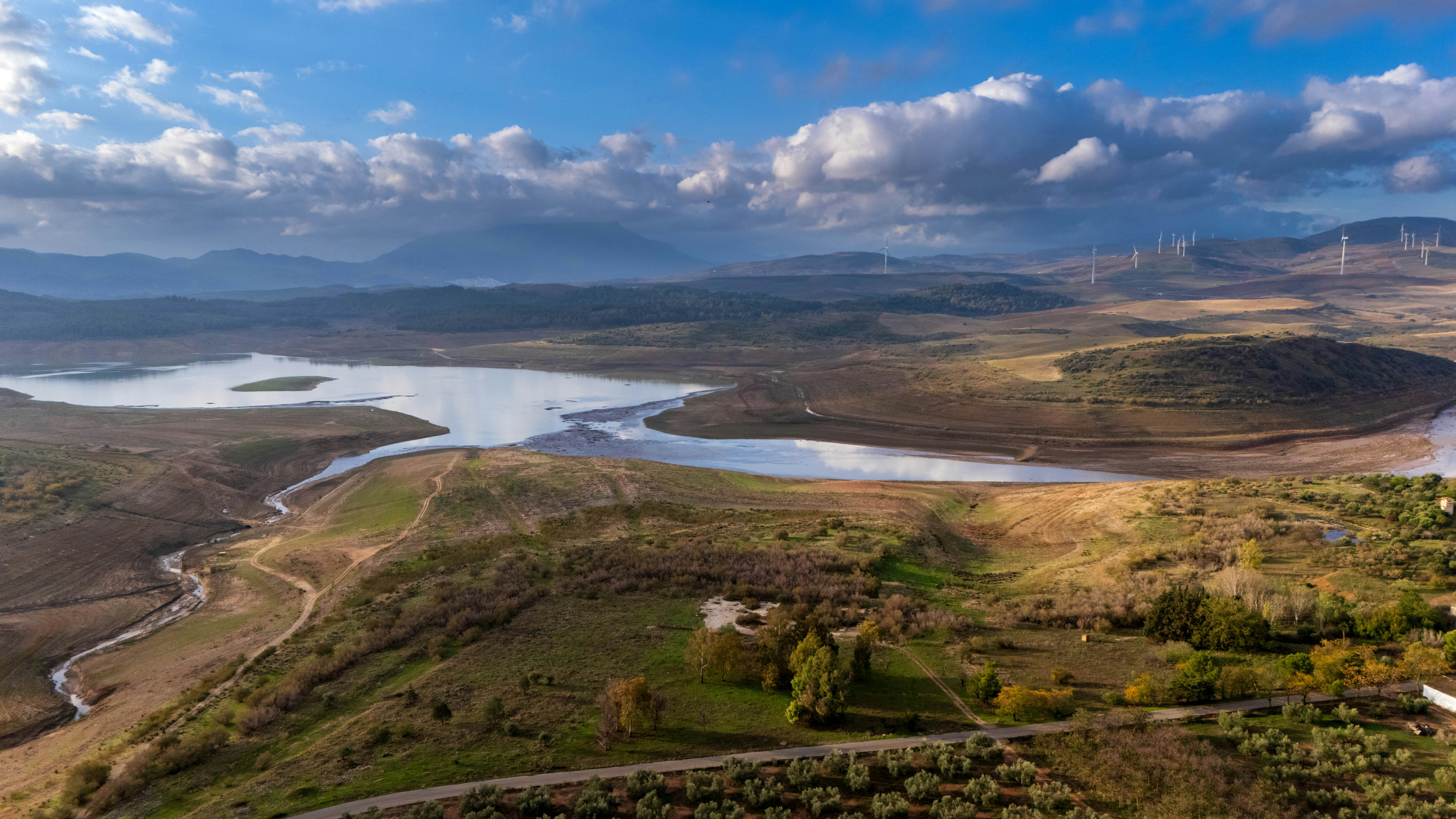 Meandering river valley under a quilt of rolling hills