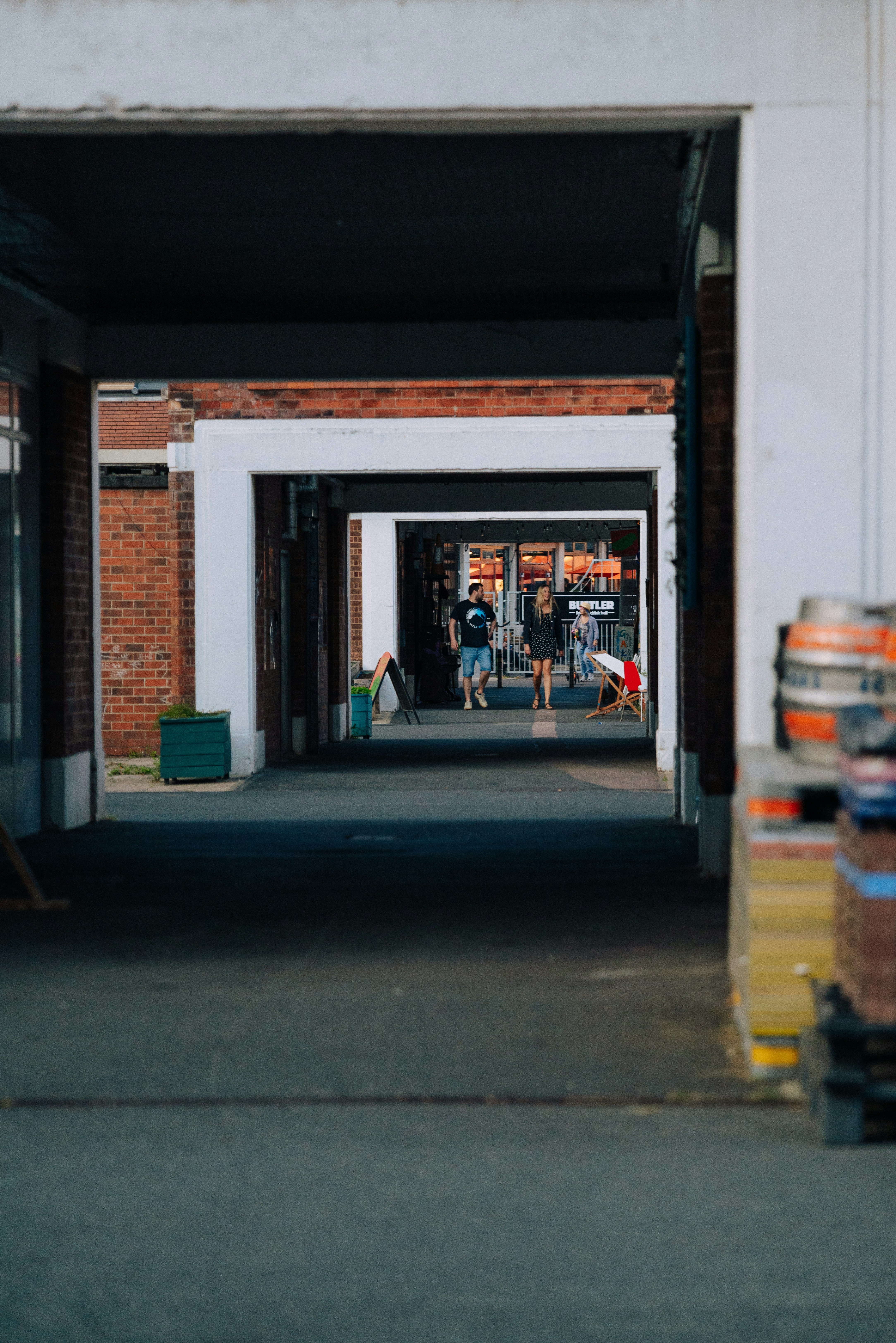 Through the Corridor of Frames: A Quiet Gathering Under Repeating Arches