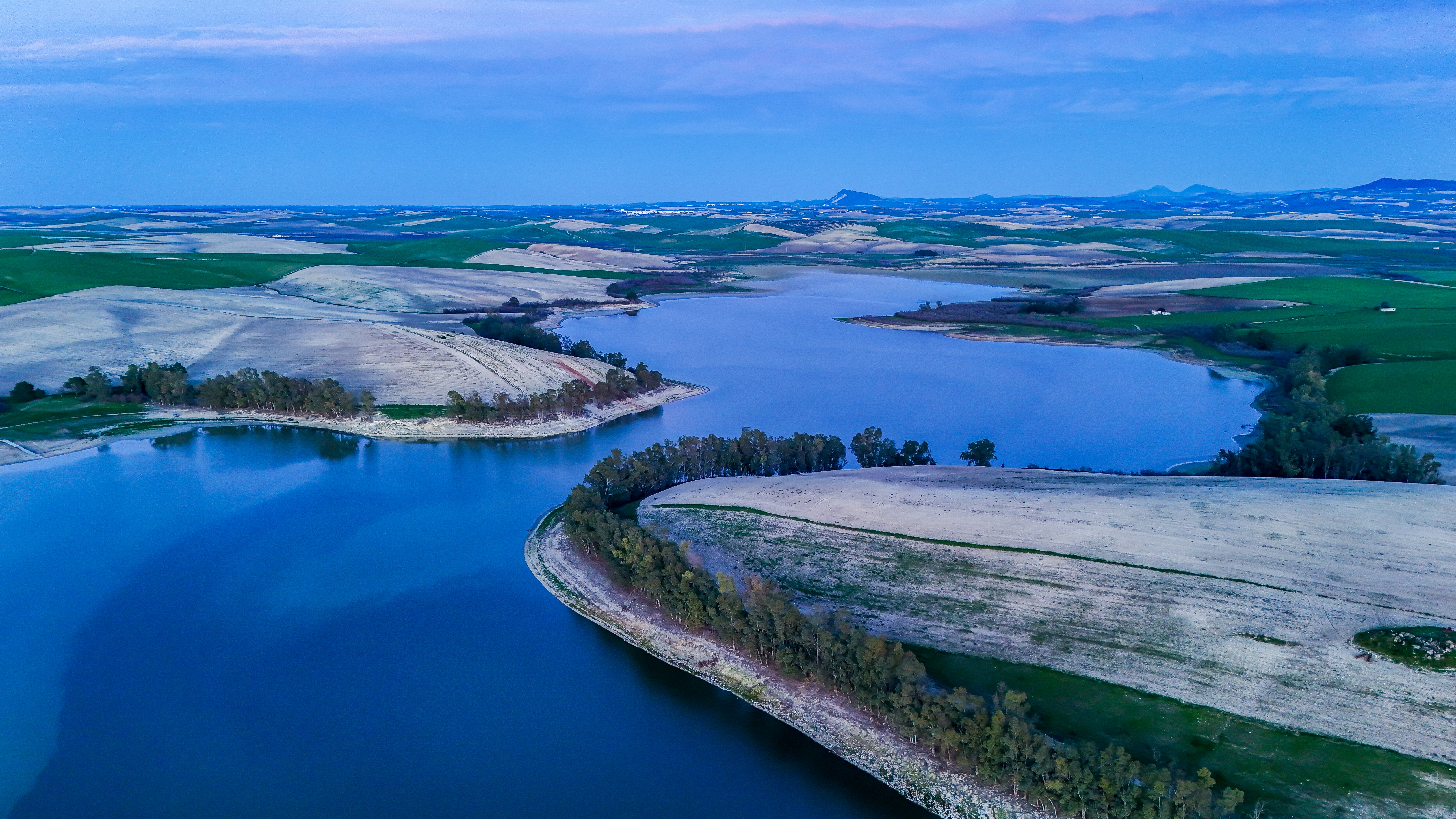 Coastal ribbons: Aerial estuary threading between fields