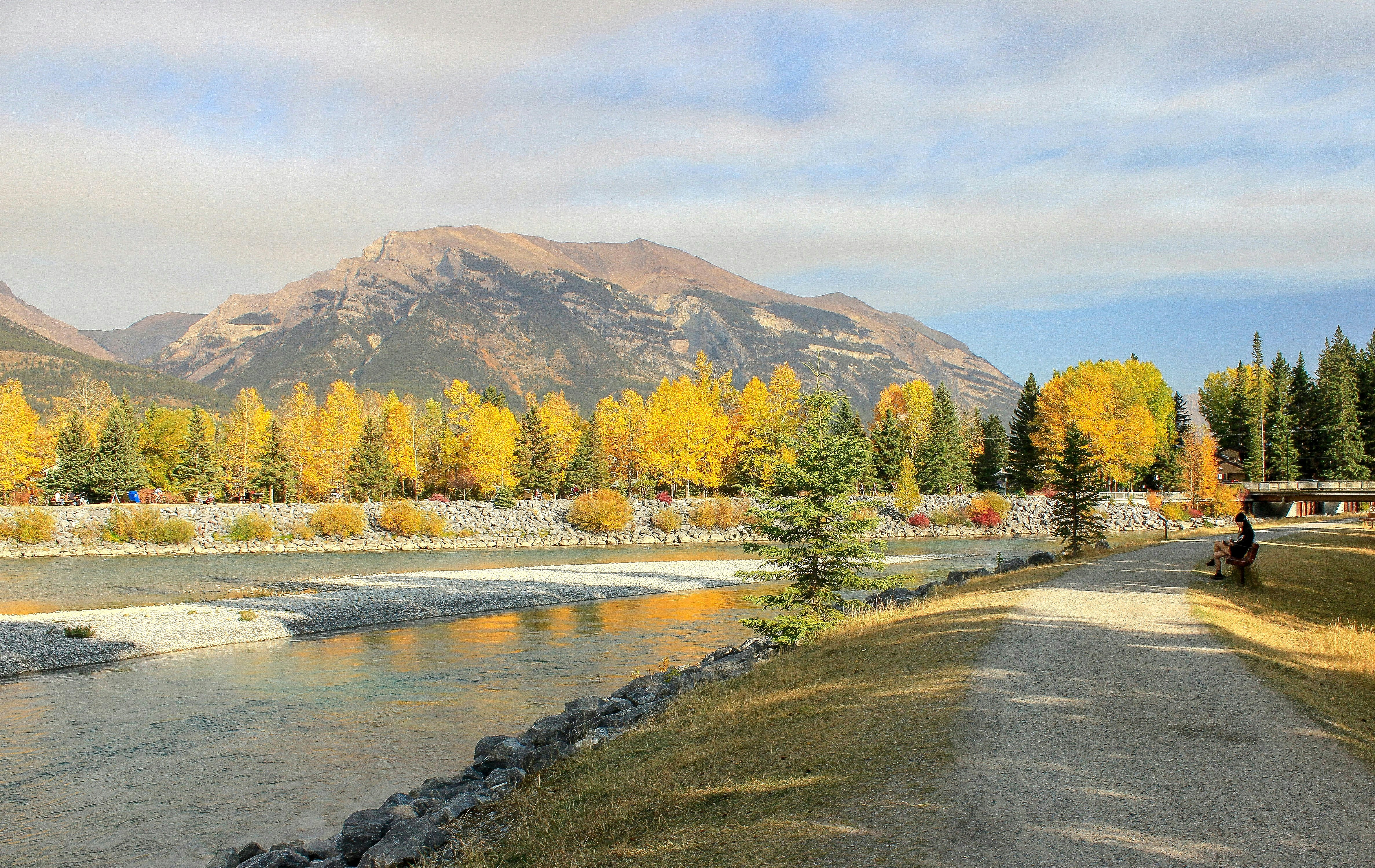 Riverbank Ramble Under Autumn Peaks