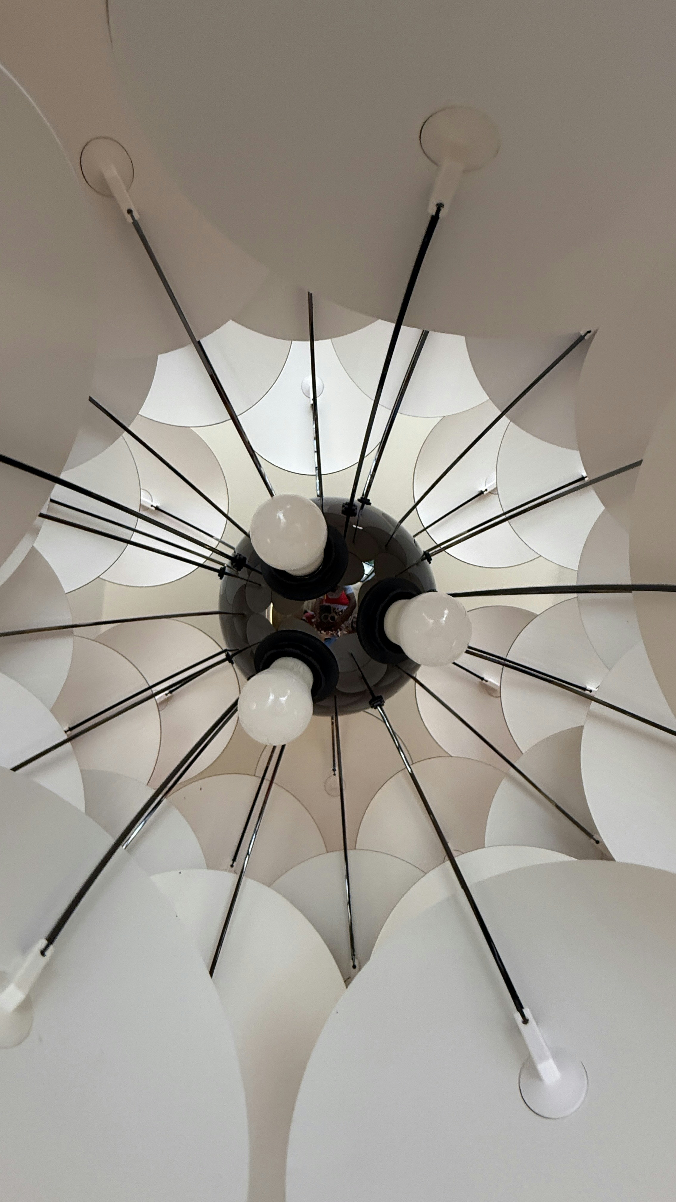 Spiral Lighting: A Ceiling Constellation of Orbs and Strings