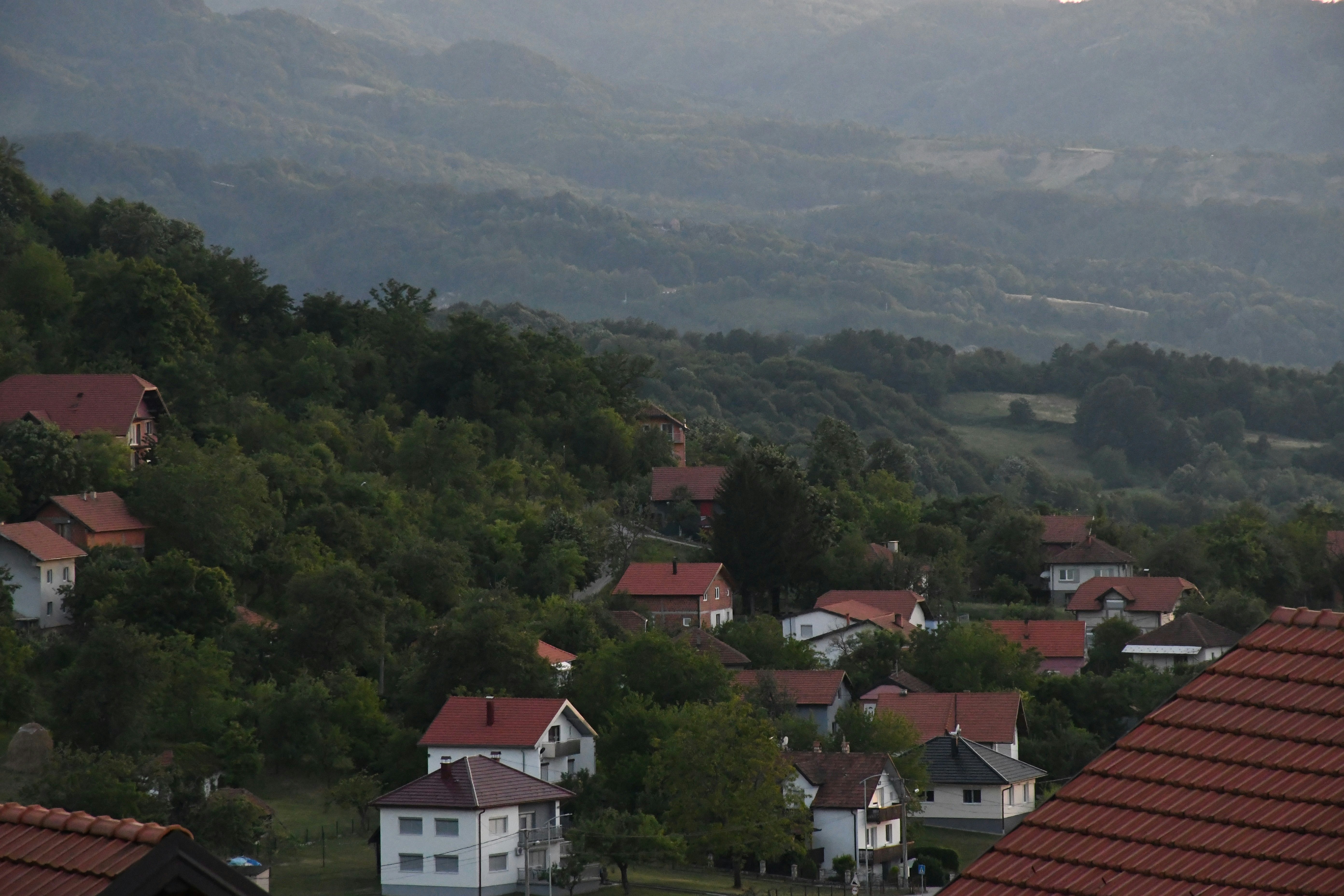 Red-Tiled Village Cresting the Hillside