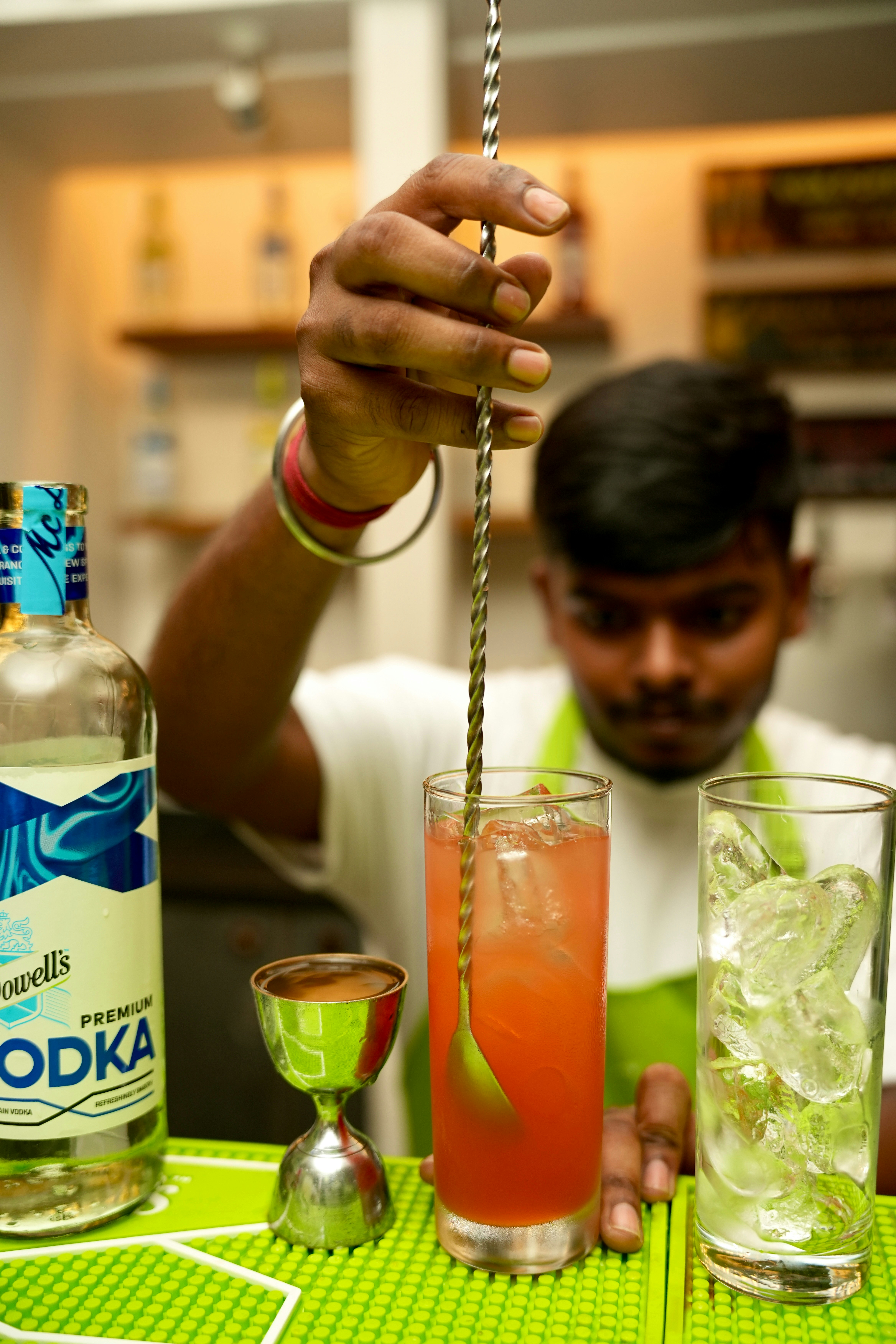Shaken Spotlight: A bartender’s steady hand weaving color into a citrus moment