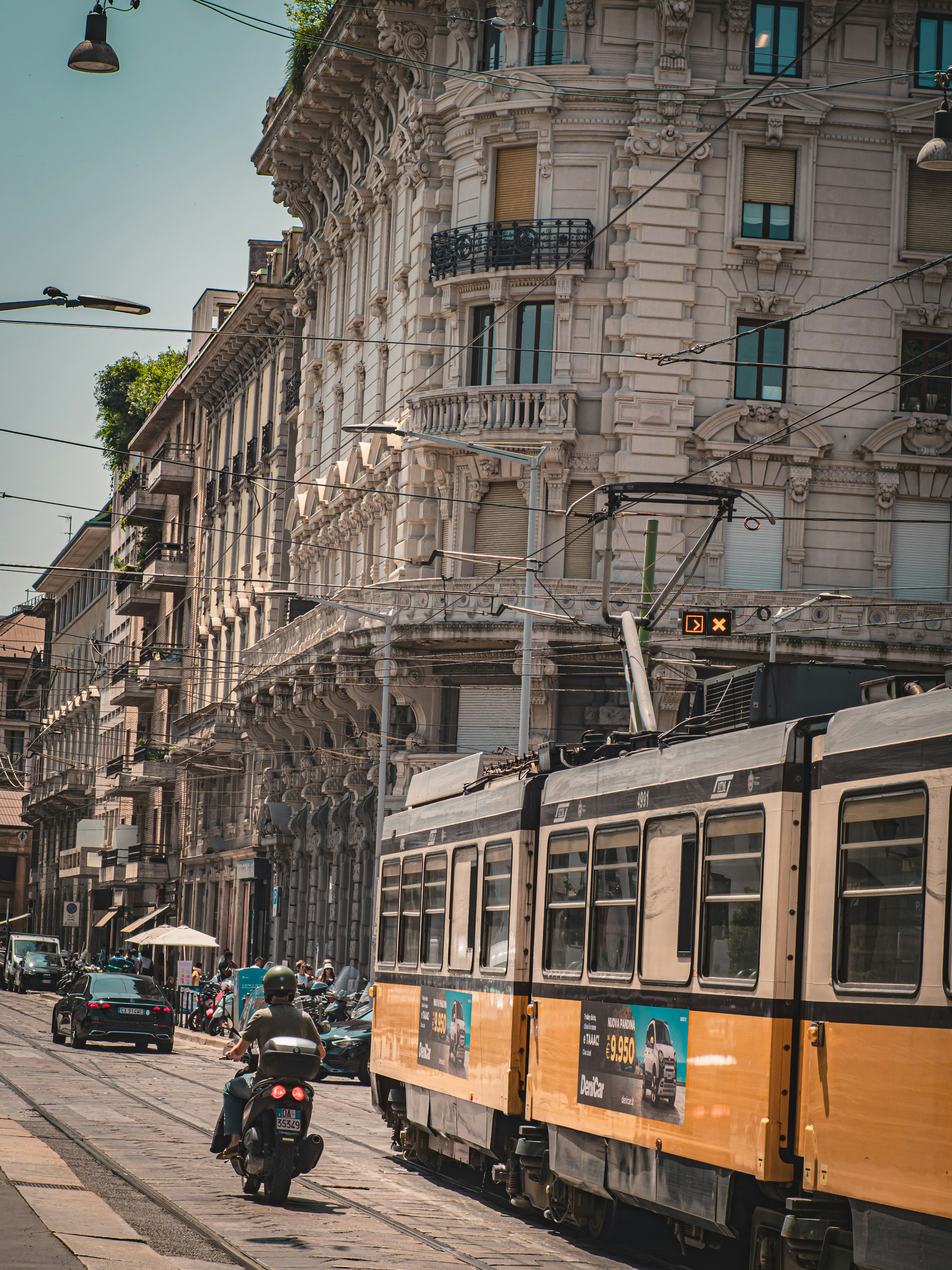Urban Ribbon: The Tram and Historic Facade in Motion