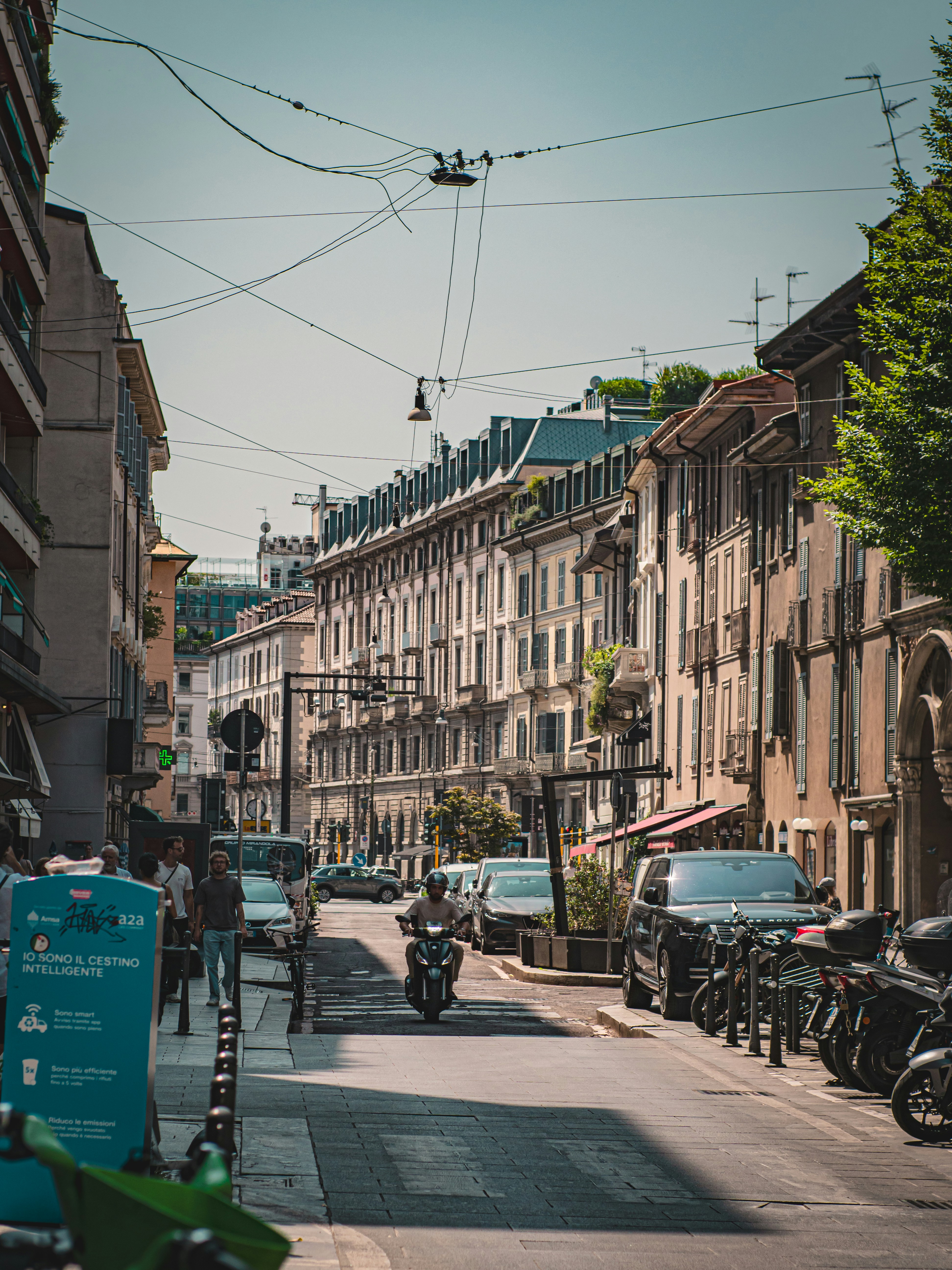City Street Corridor Under Tangle of Wires