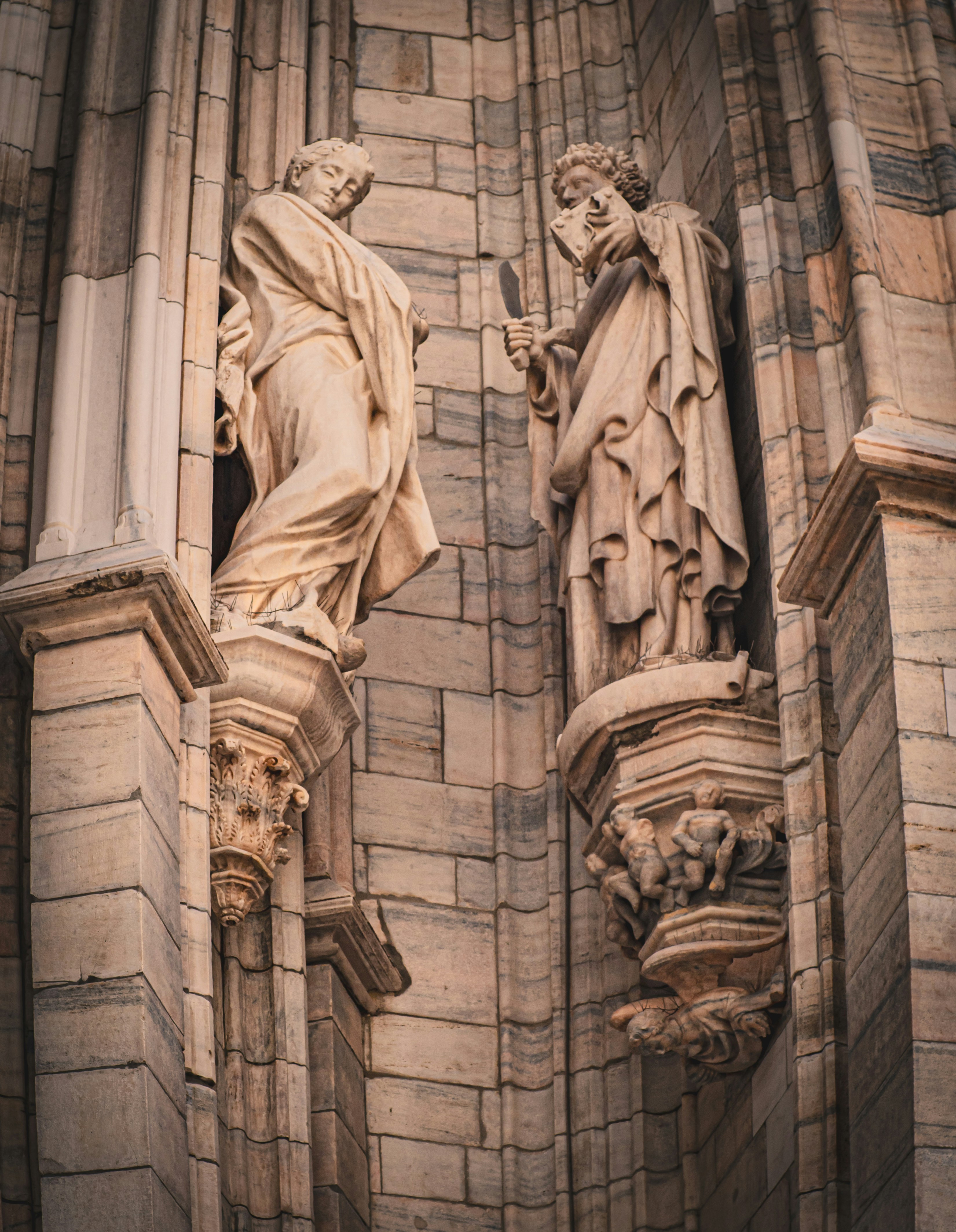 Statues at the Gilded Portal: Silent Gaze of Stone