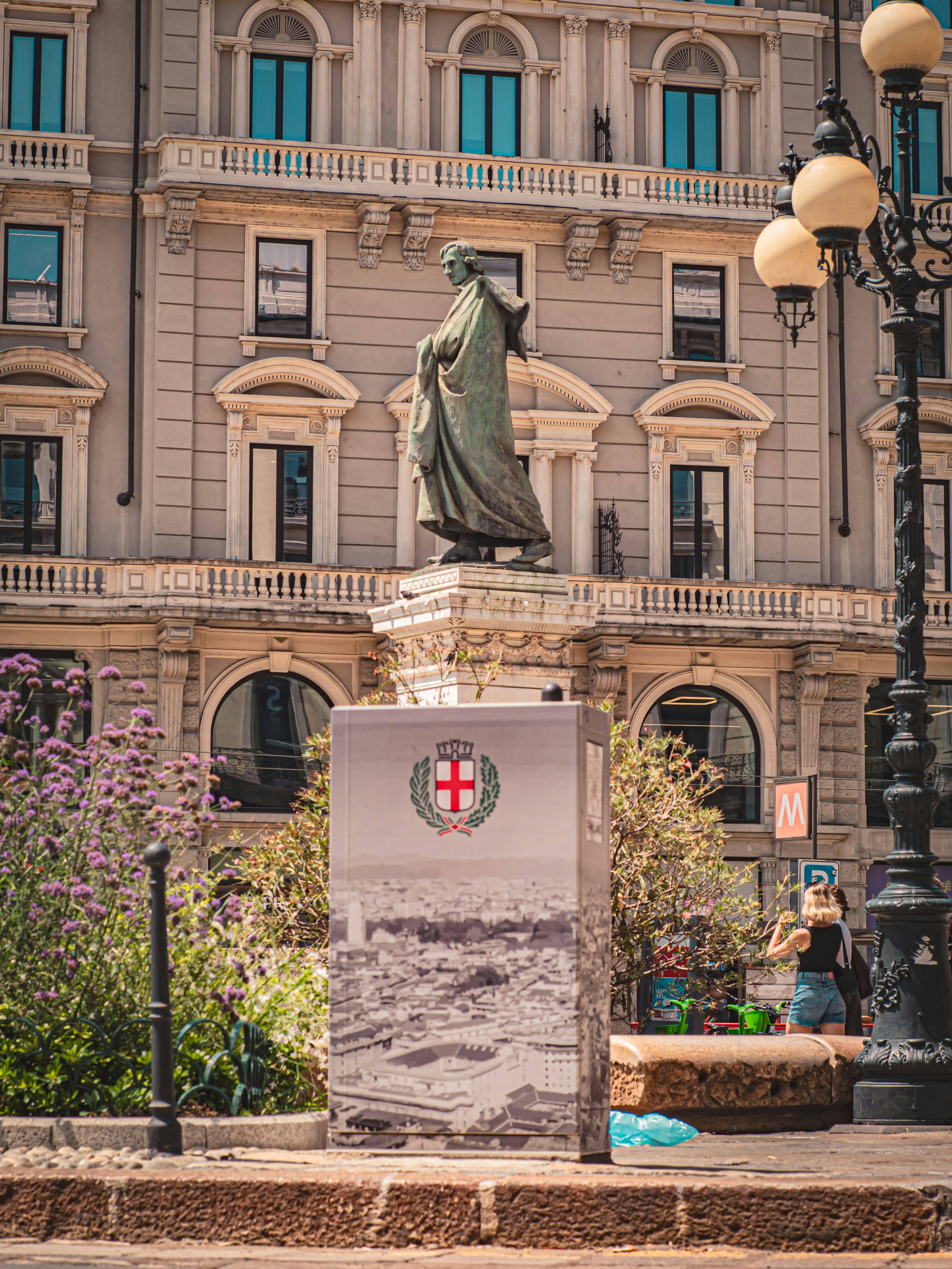 Statue Overlook: A City Monument Framed by Historic Facades