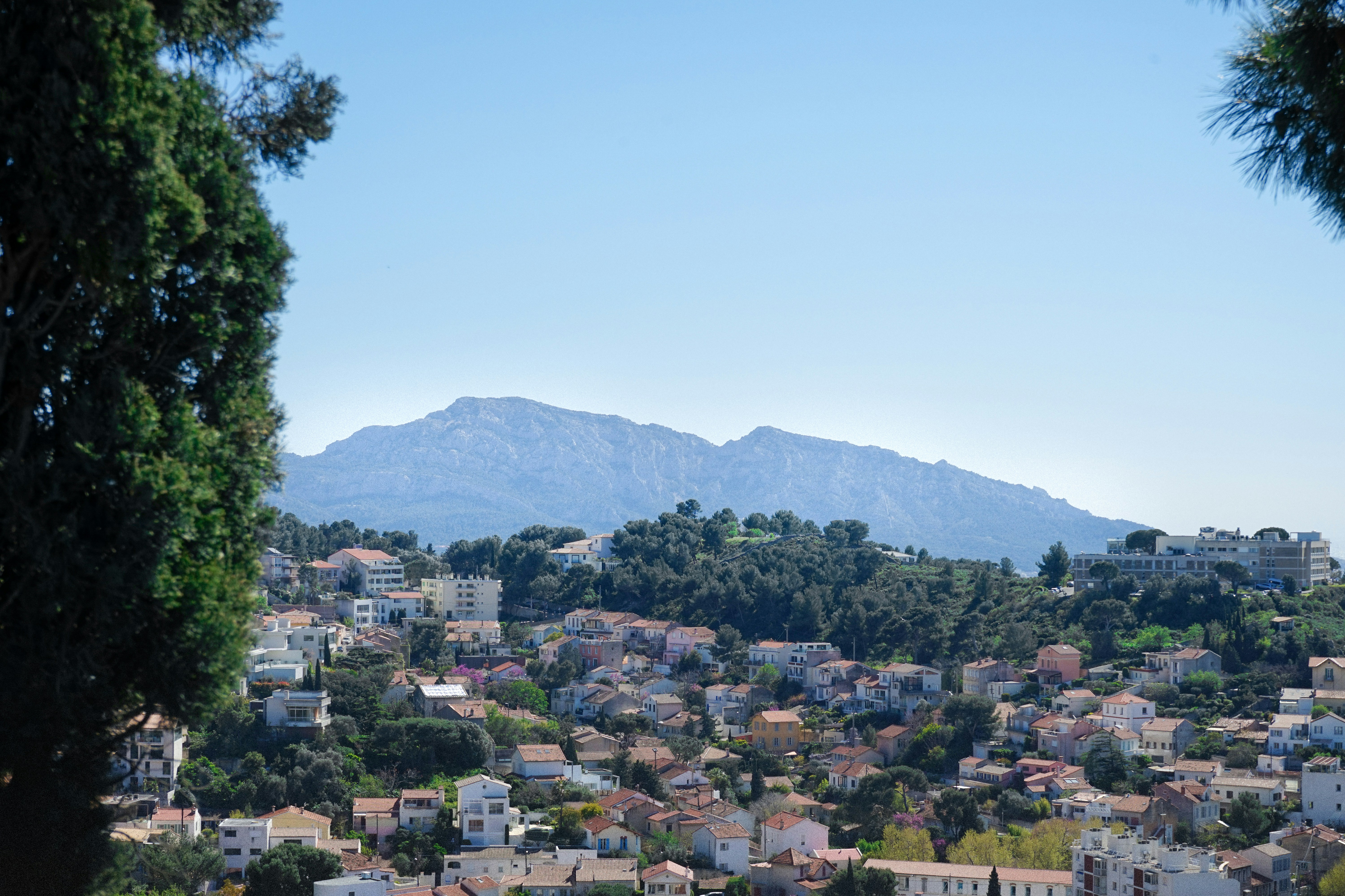 A Quiet Mountain Ridge Overlooking a Coastal Town