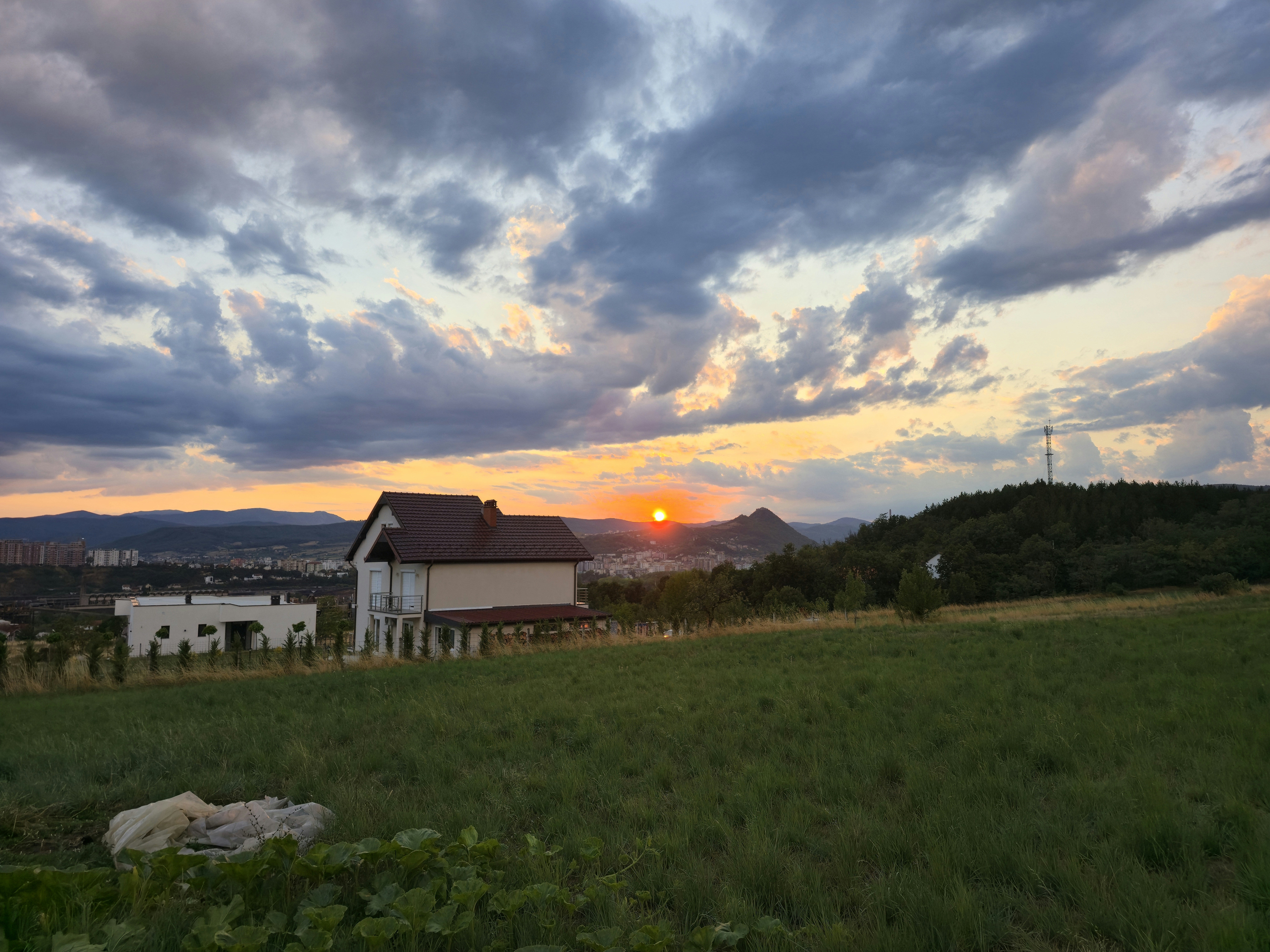 Sunset Over the Cottage: Quiet Field at Dusk