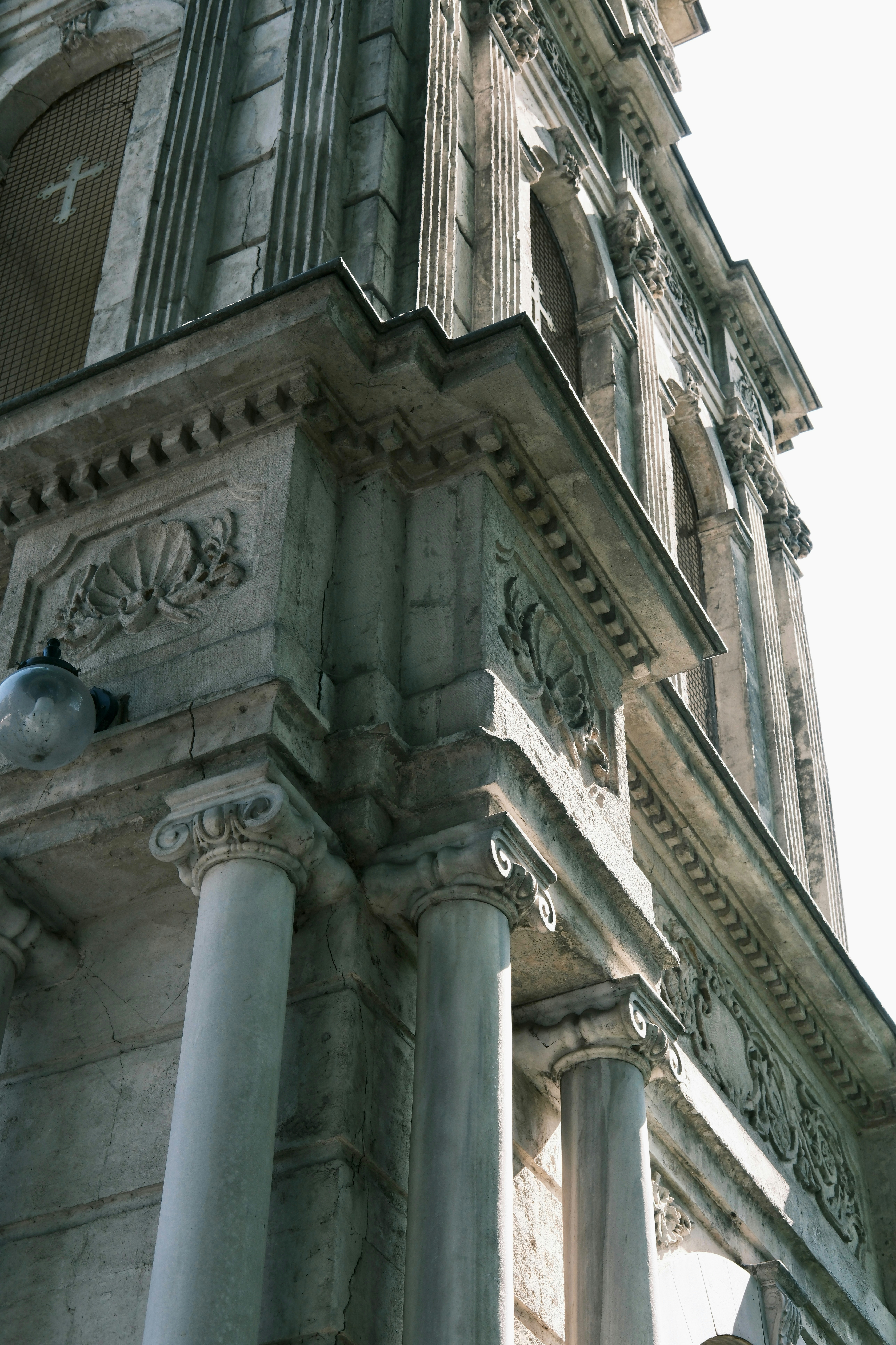 Stone Echoes: Carved Facade and Marble Columns