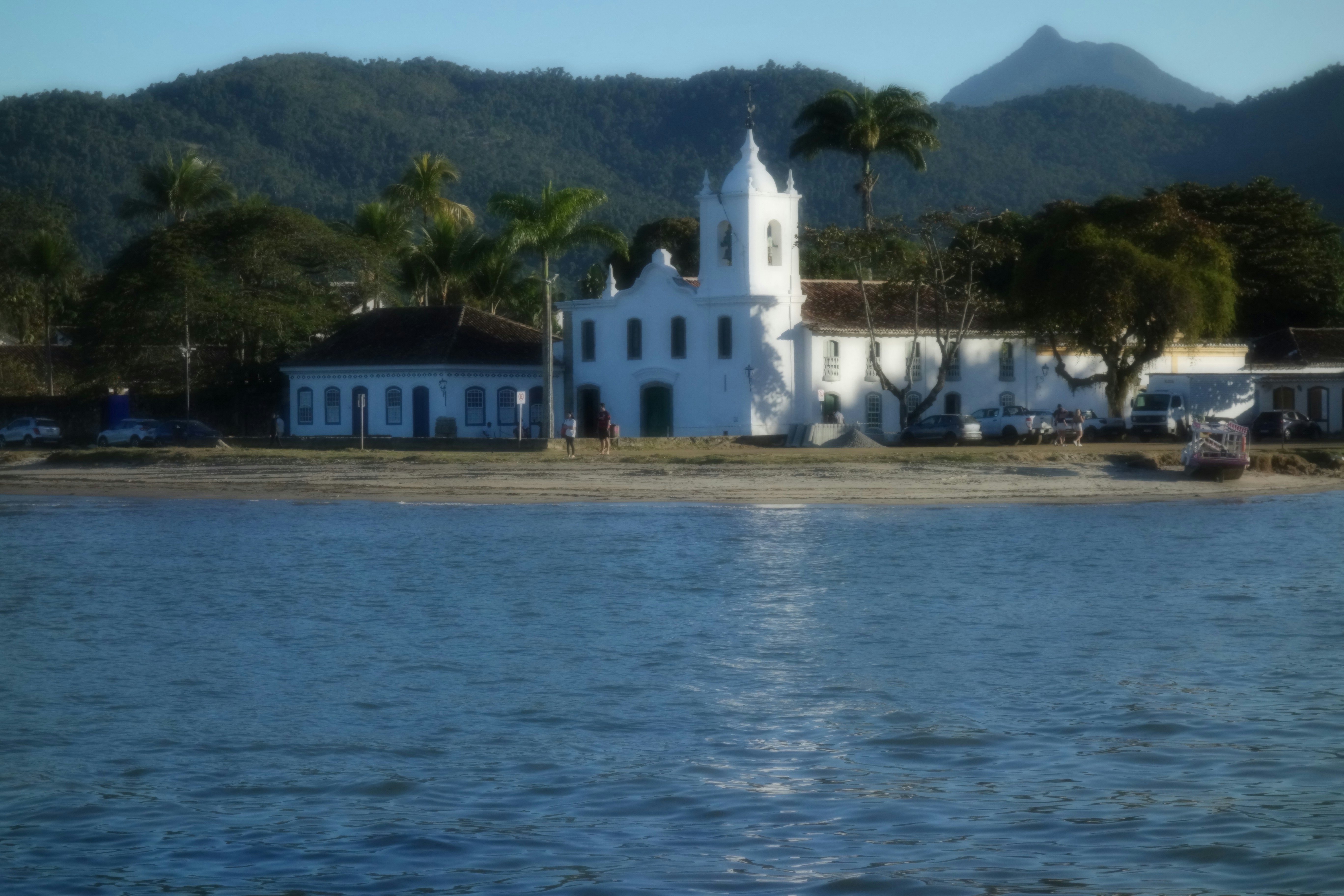 White Chapel by the Shore: A Quiet Coastal Scene