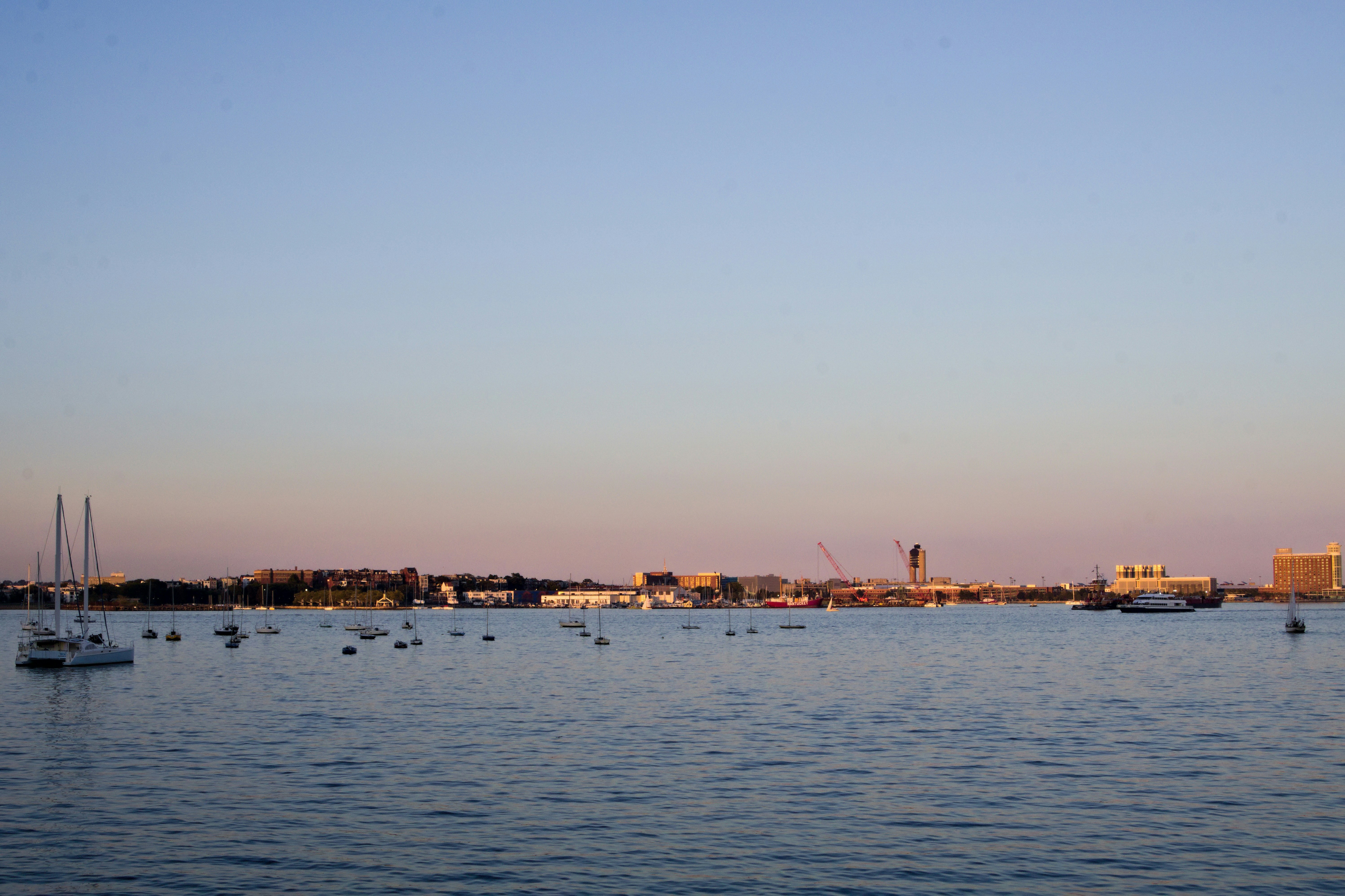 Harbor Horizon at Dusk: Boats Rest Along the Quiet Waterfront