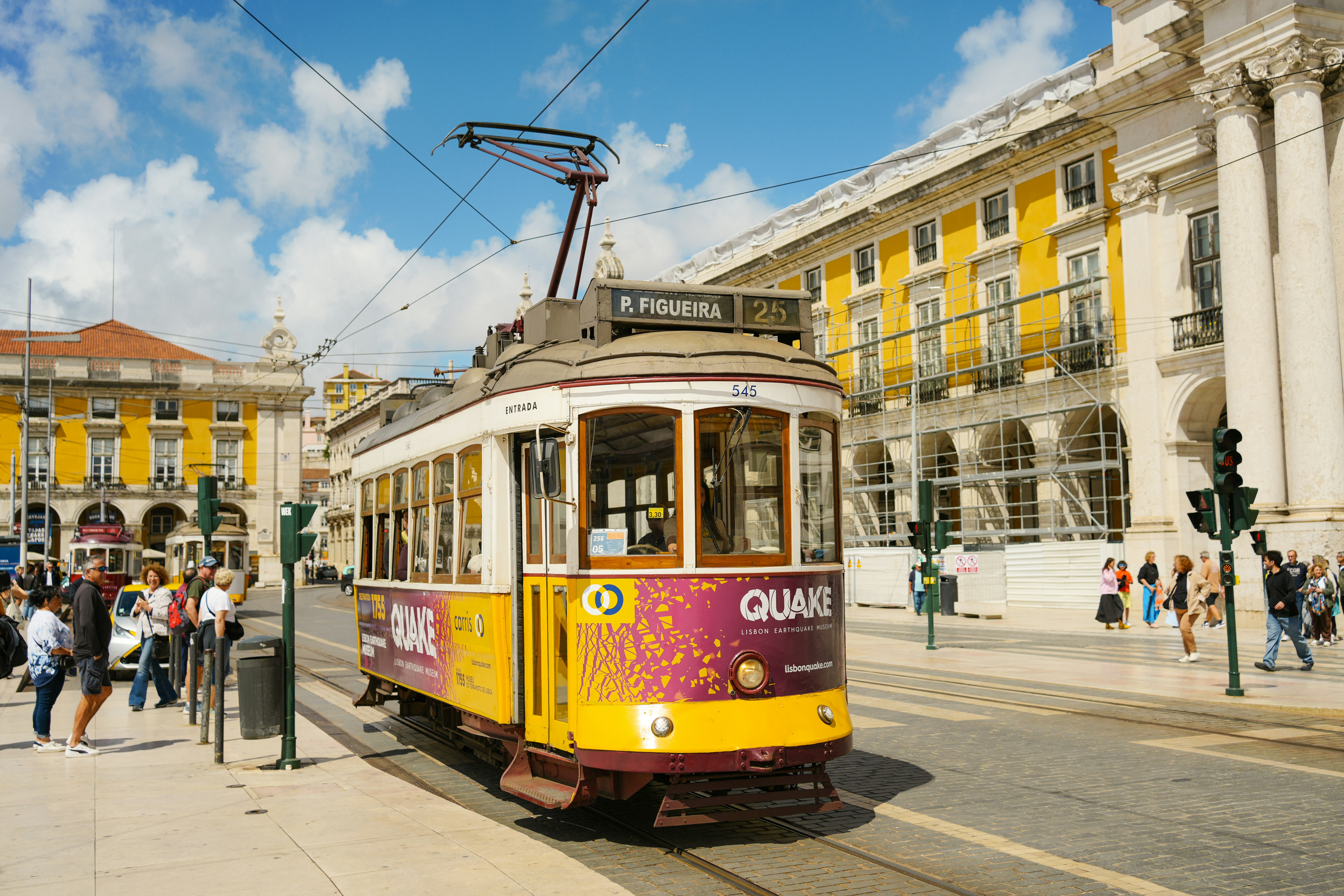 Yellow Tram in Lisbon: A Sunlit Ride Through Historic Streets