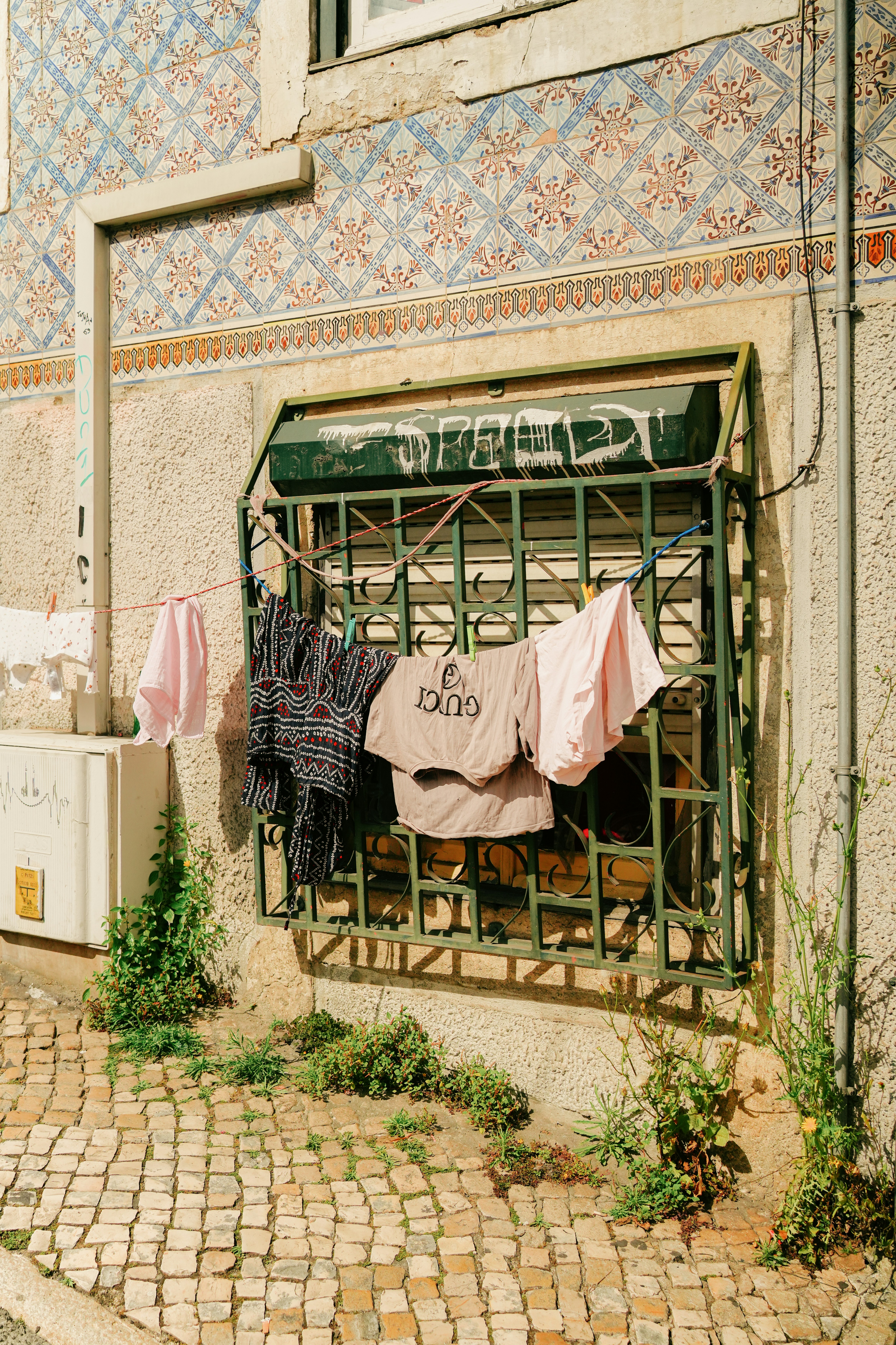 Washing Line on a Grated Window: A Quiet Urban Patch