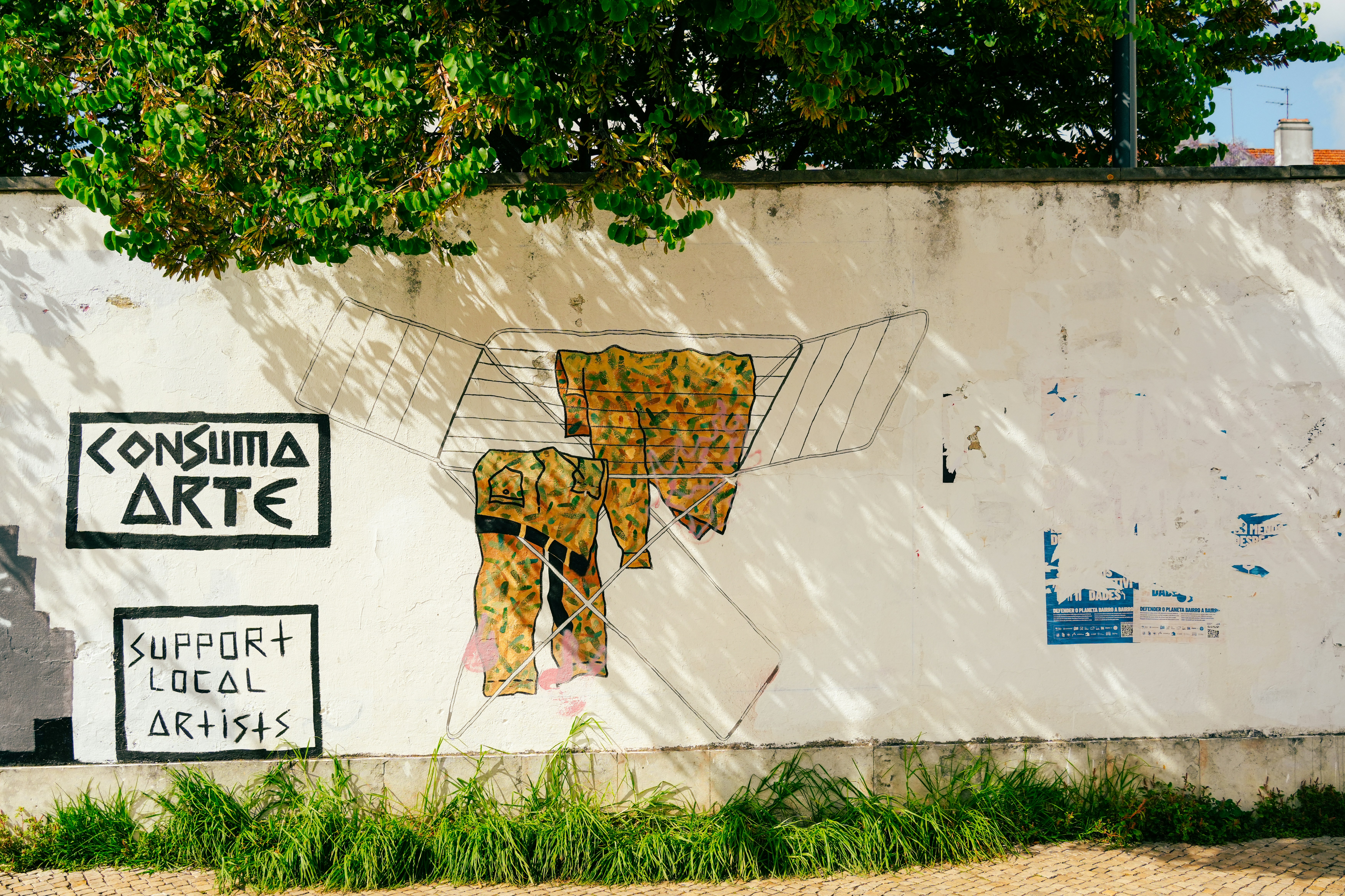 Mosaic of Art on a Sunlit Wall