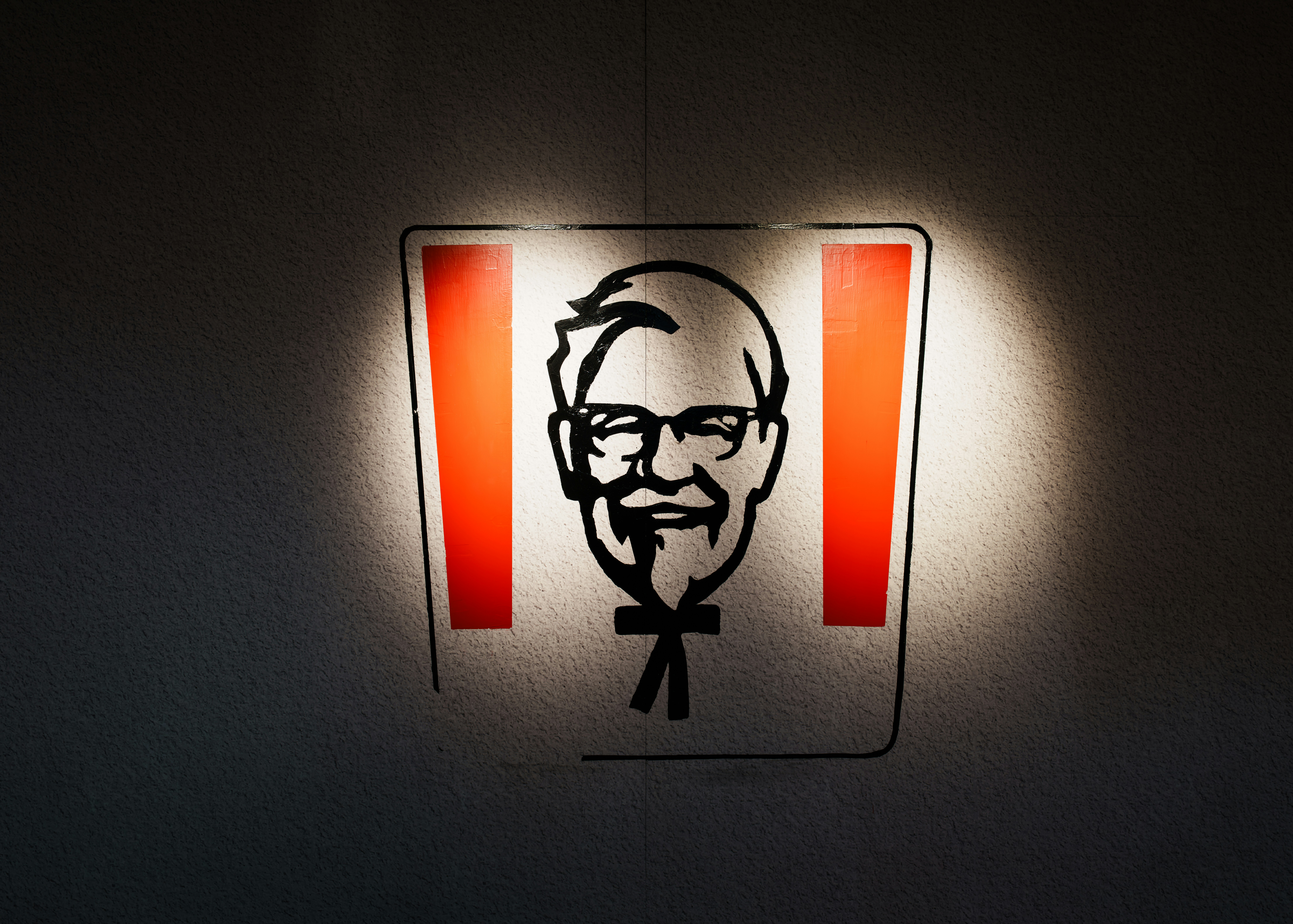 Illuminated Colonel Sanders: A Neon Sign Snapshot