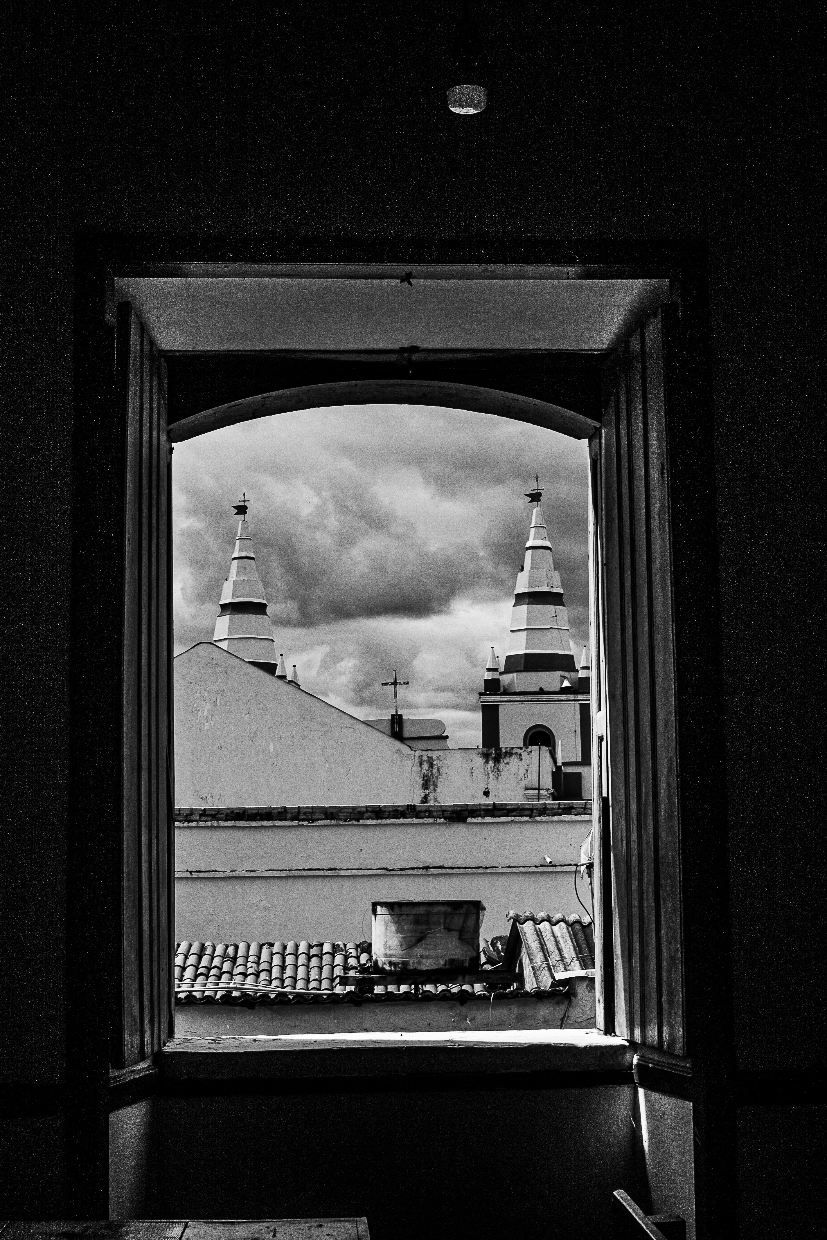 Through the Window: Cathedral Spires Framing the Sky