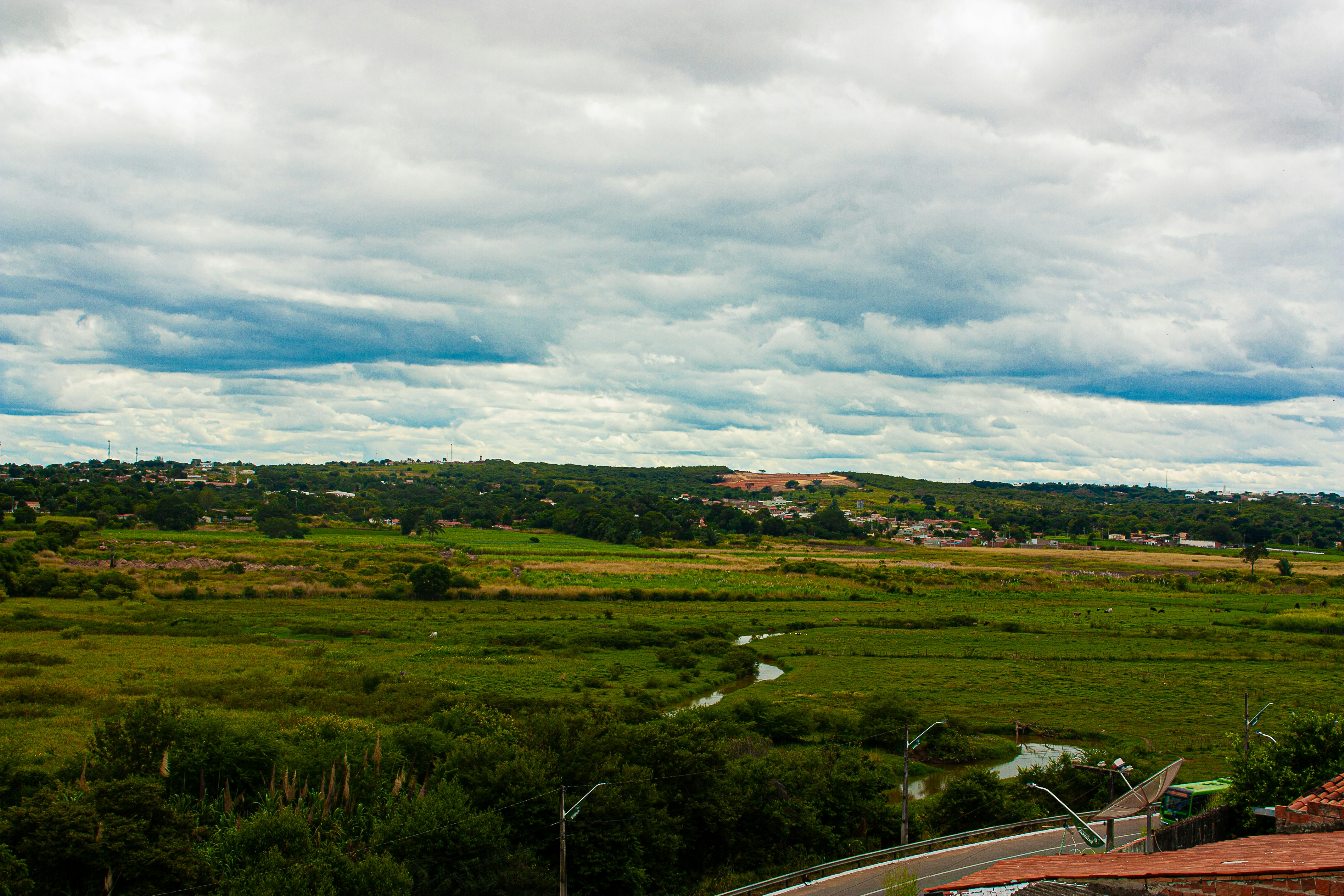 Rural Horizon: A Quiet Valley Under Wide Skies