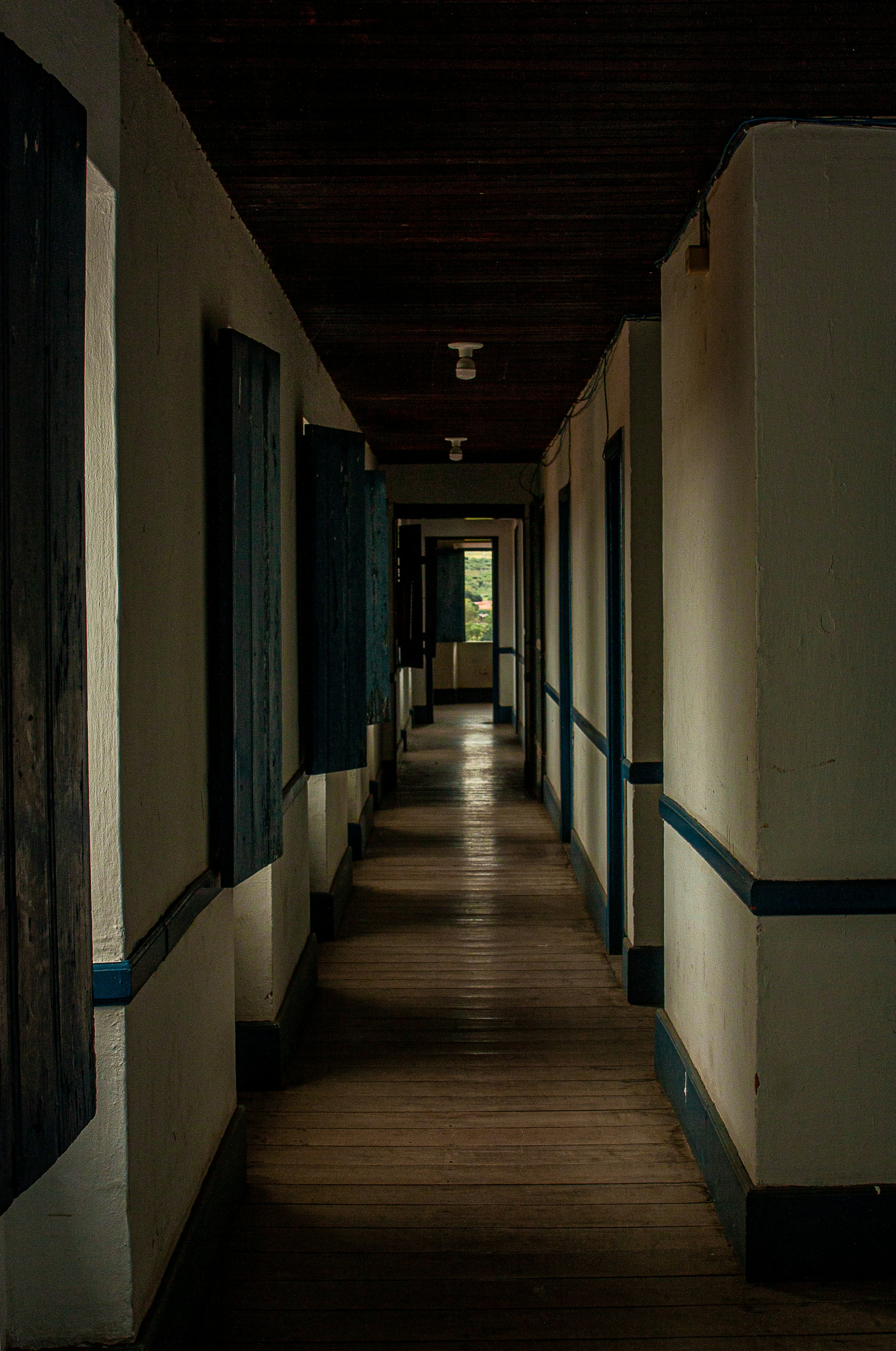 Dim Corridor to a Luminous Exit