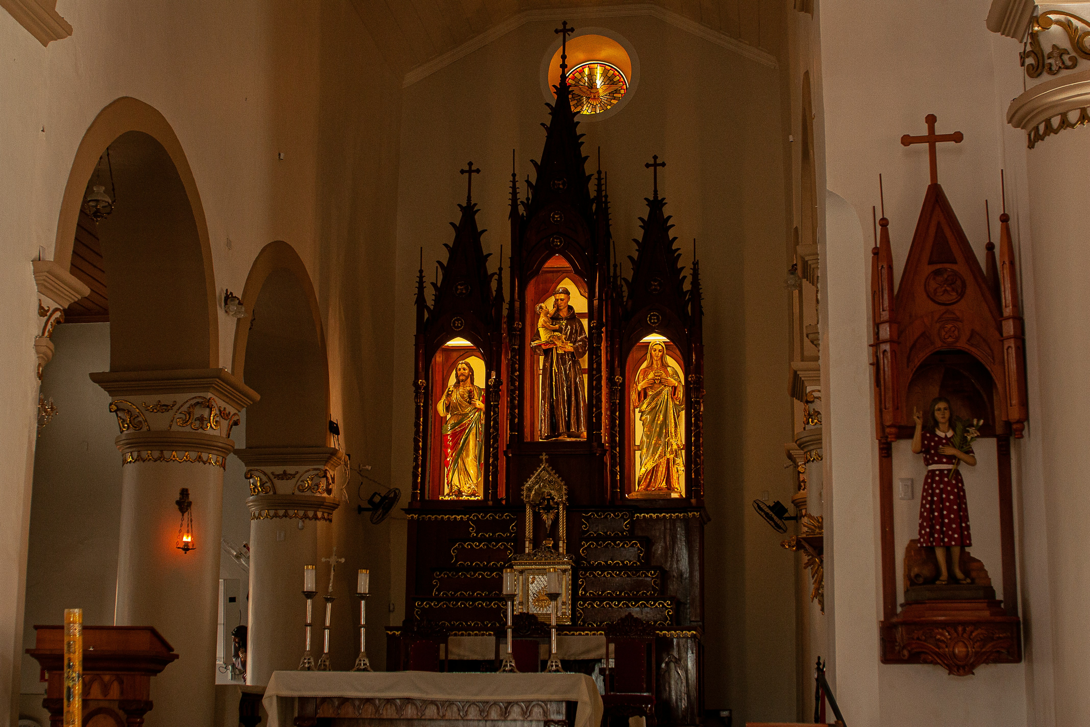 Silent Altars: A Chapel Shrine Illuminated in Warm Gothic Light