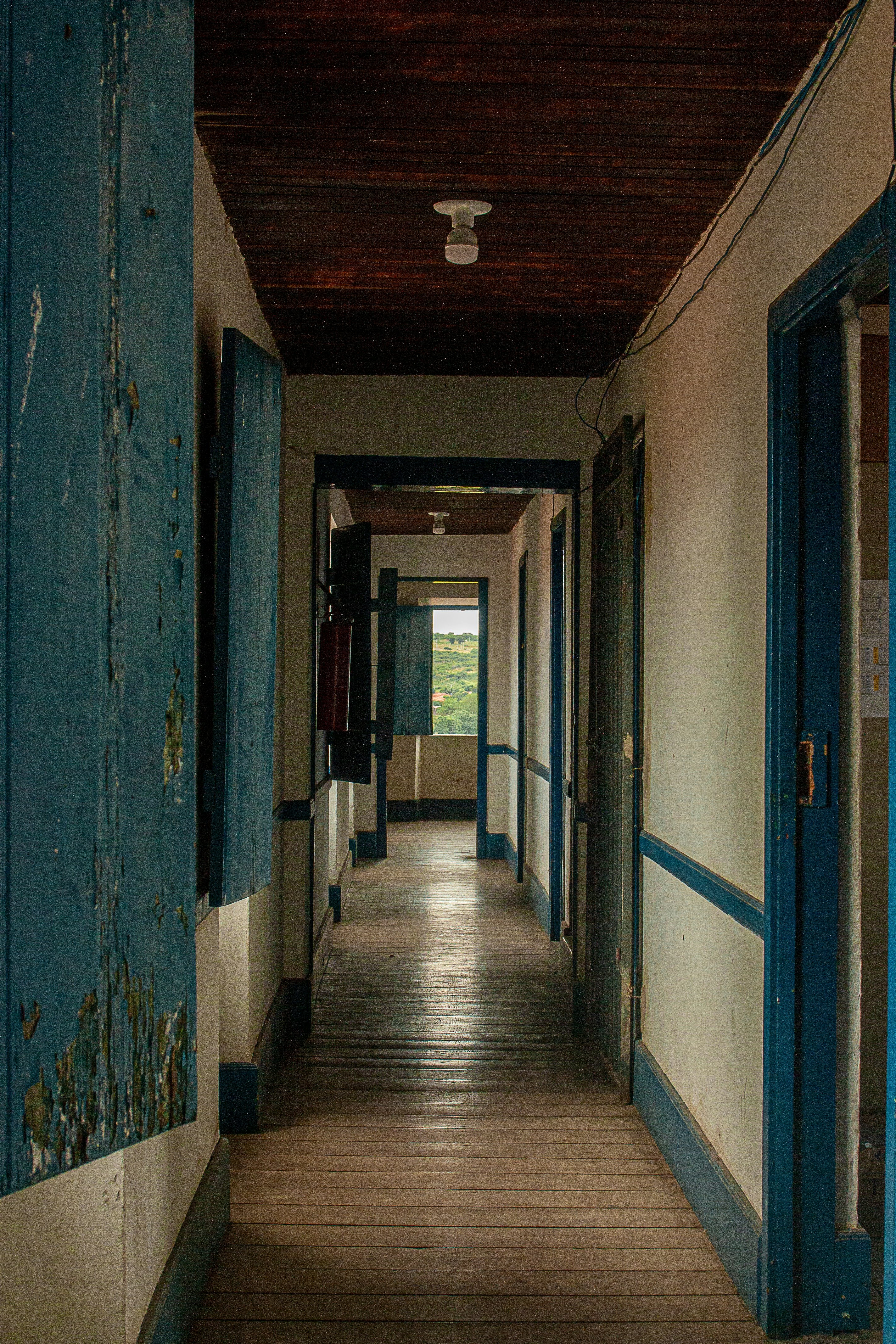 Deserted Corridor: Light at the End of the Hall