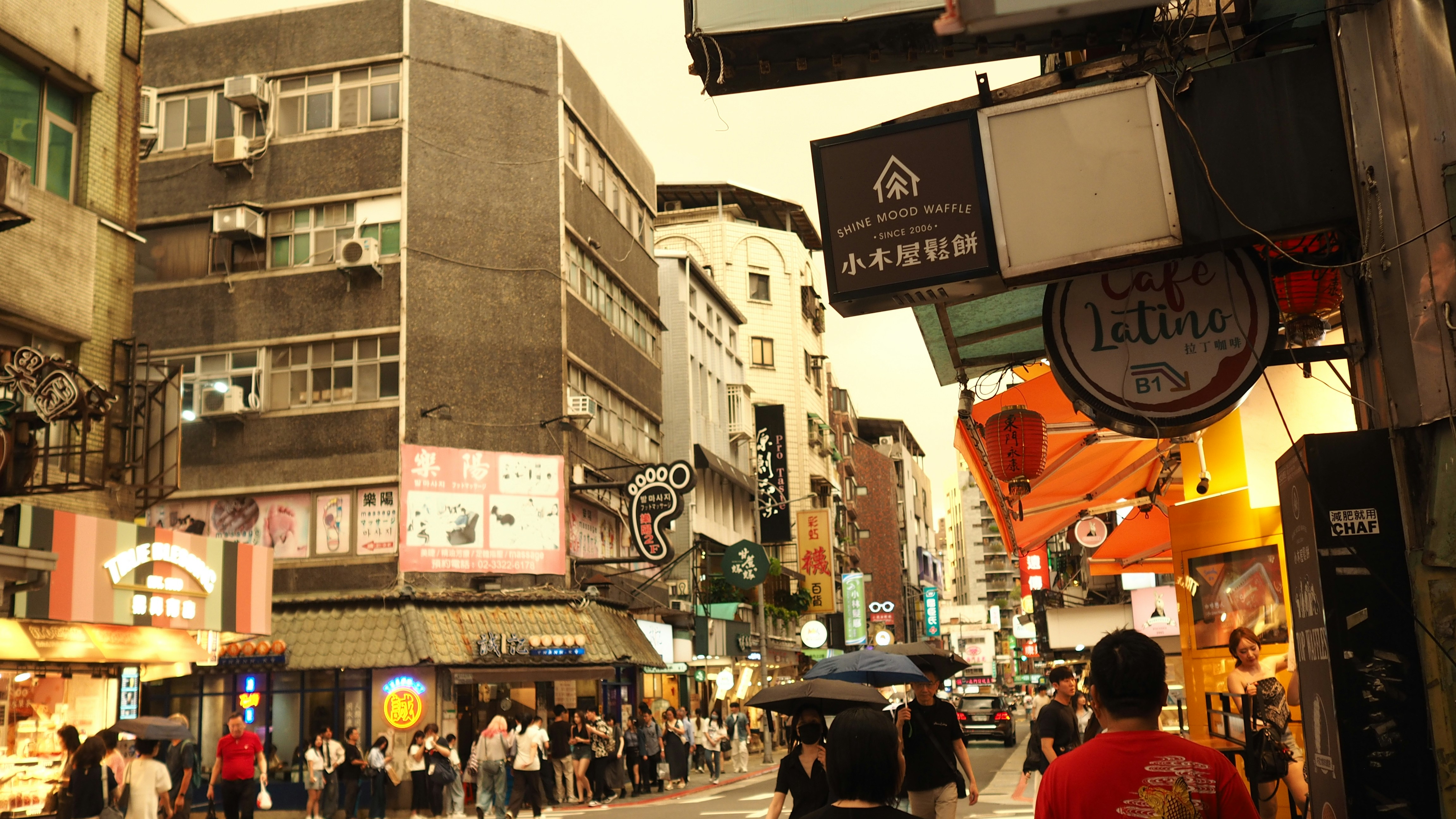Lanterns Over Lantern Alley: A Bustling Street in Warm Evening Hue