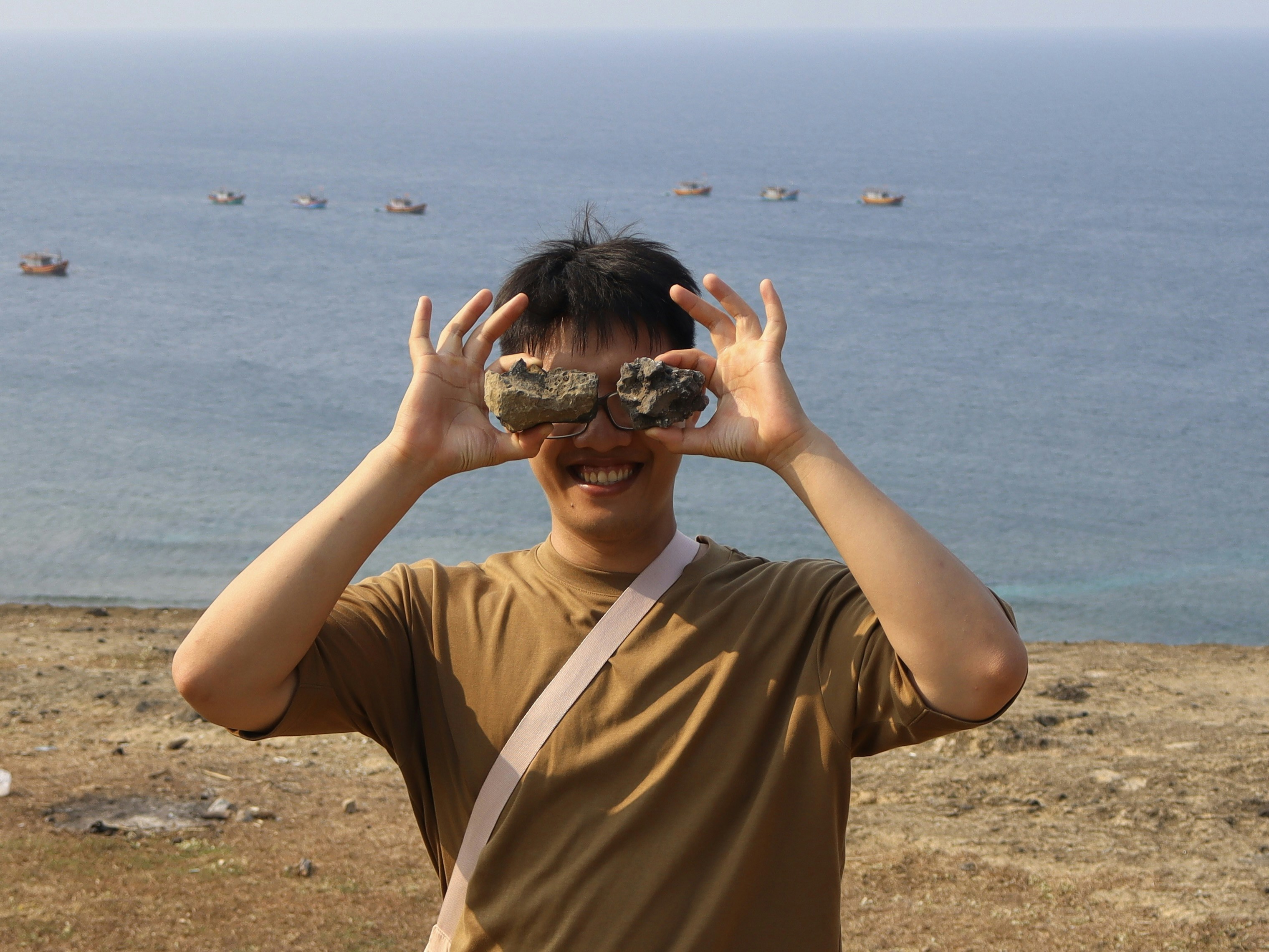Seeing the Sea Through Sunglass Reflections