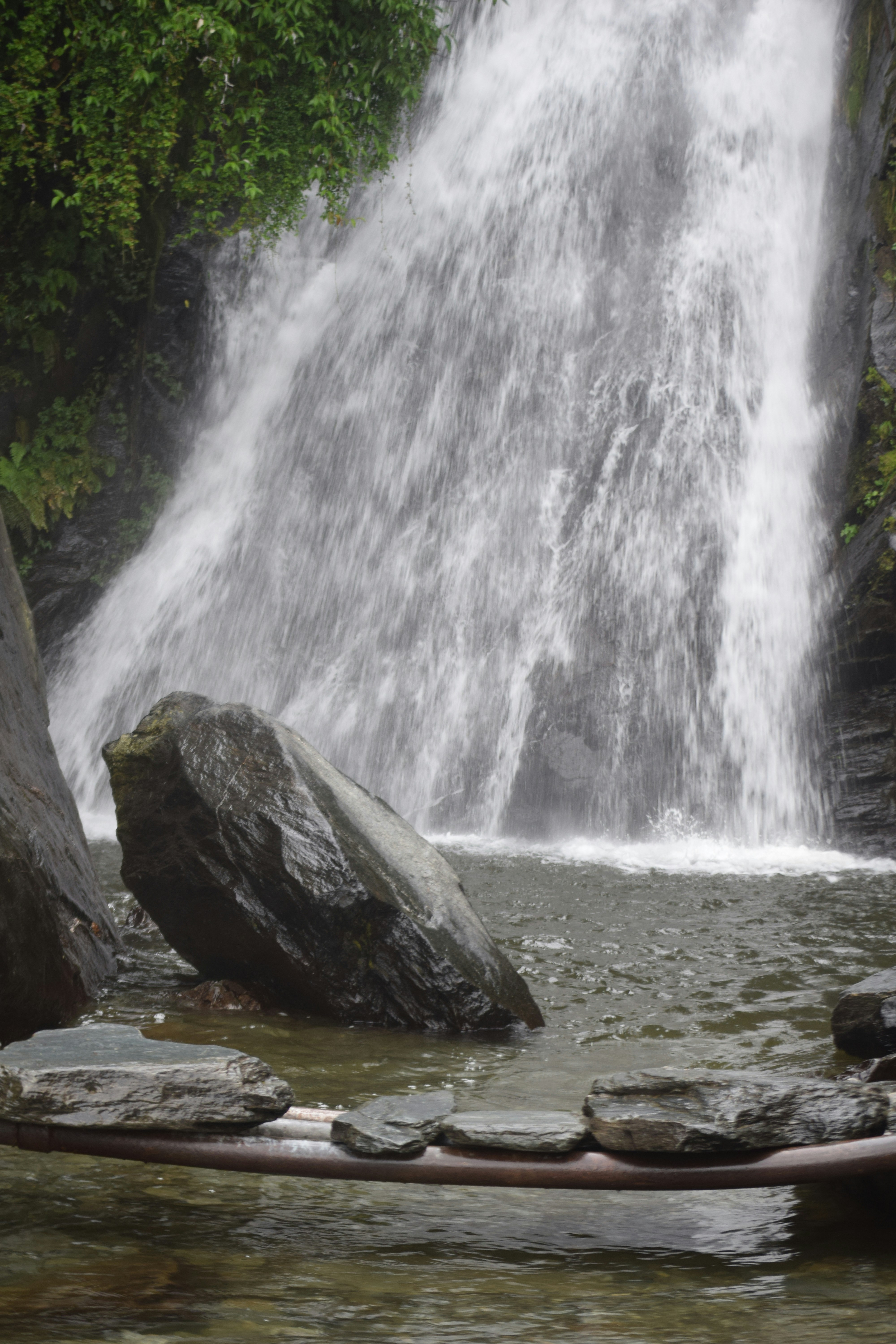 Misty Cascade Beyond the Stone Keeps
