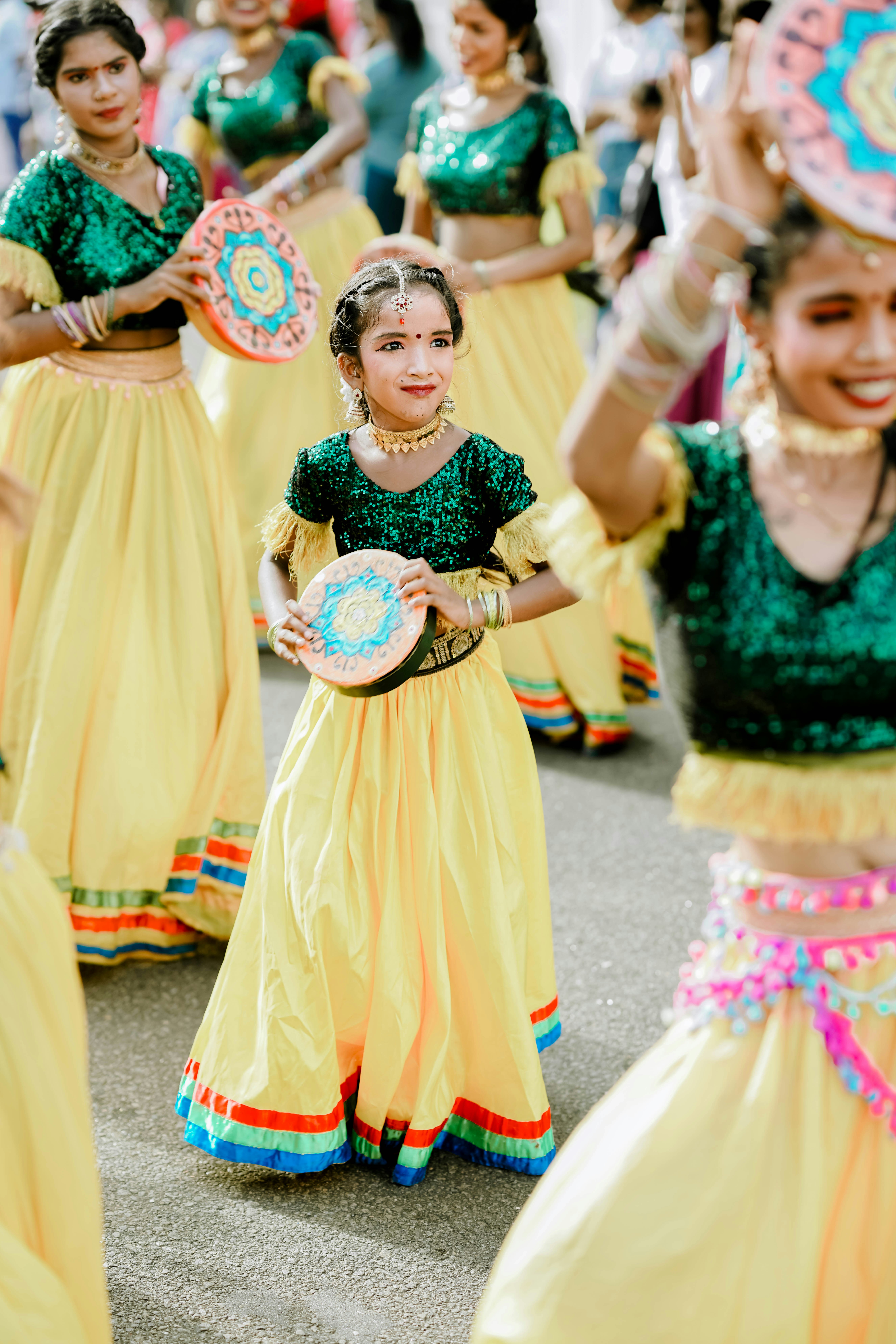 Yellow-Green Festive Steps: A Dancer in Colorful Parade