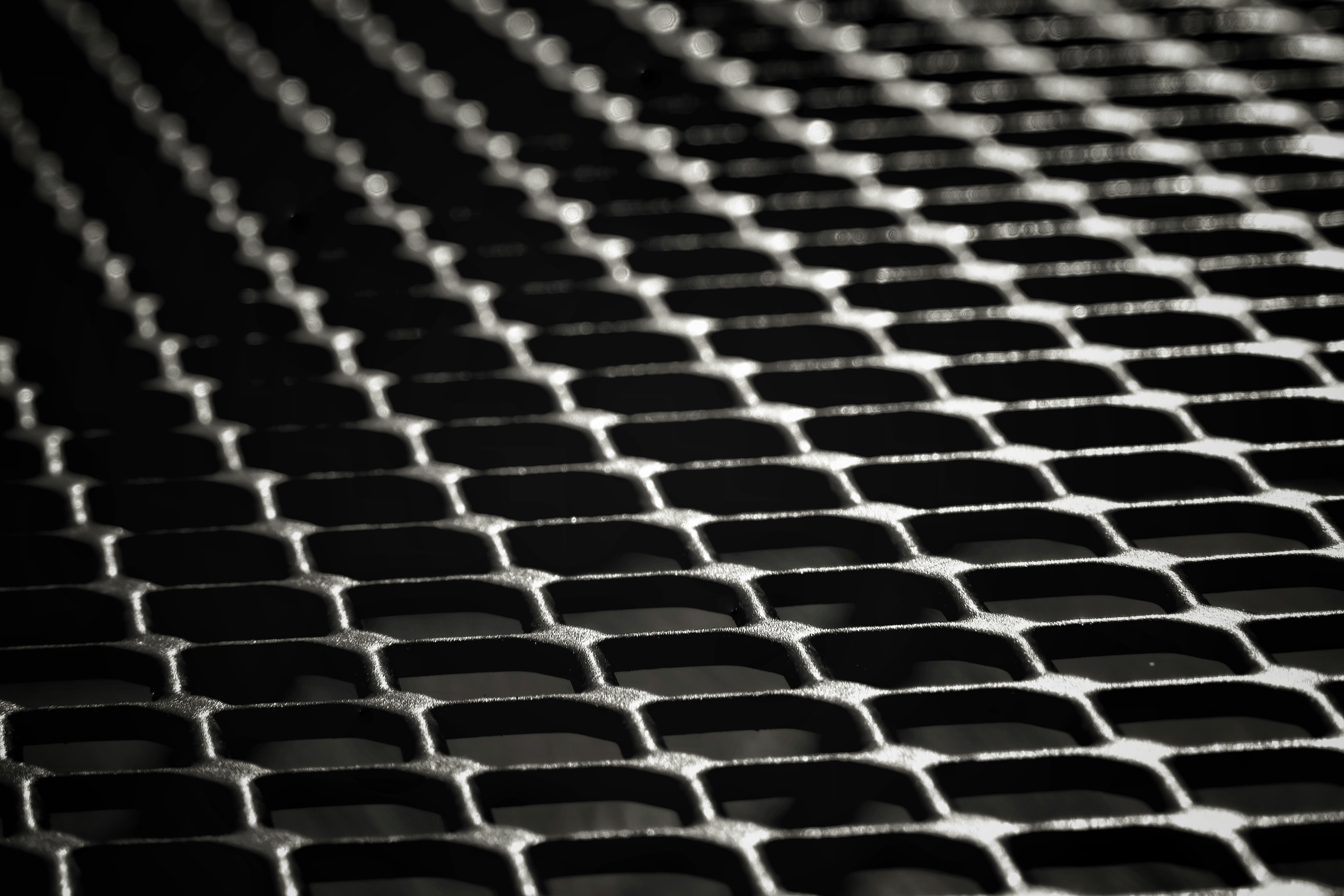 Checkerboard Echoes: Repeating Motif in Black and Light