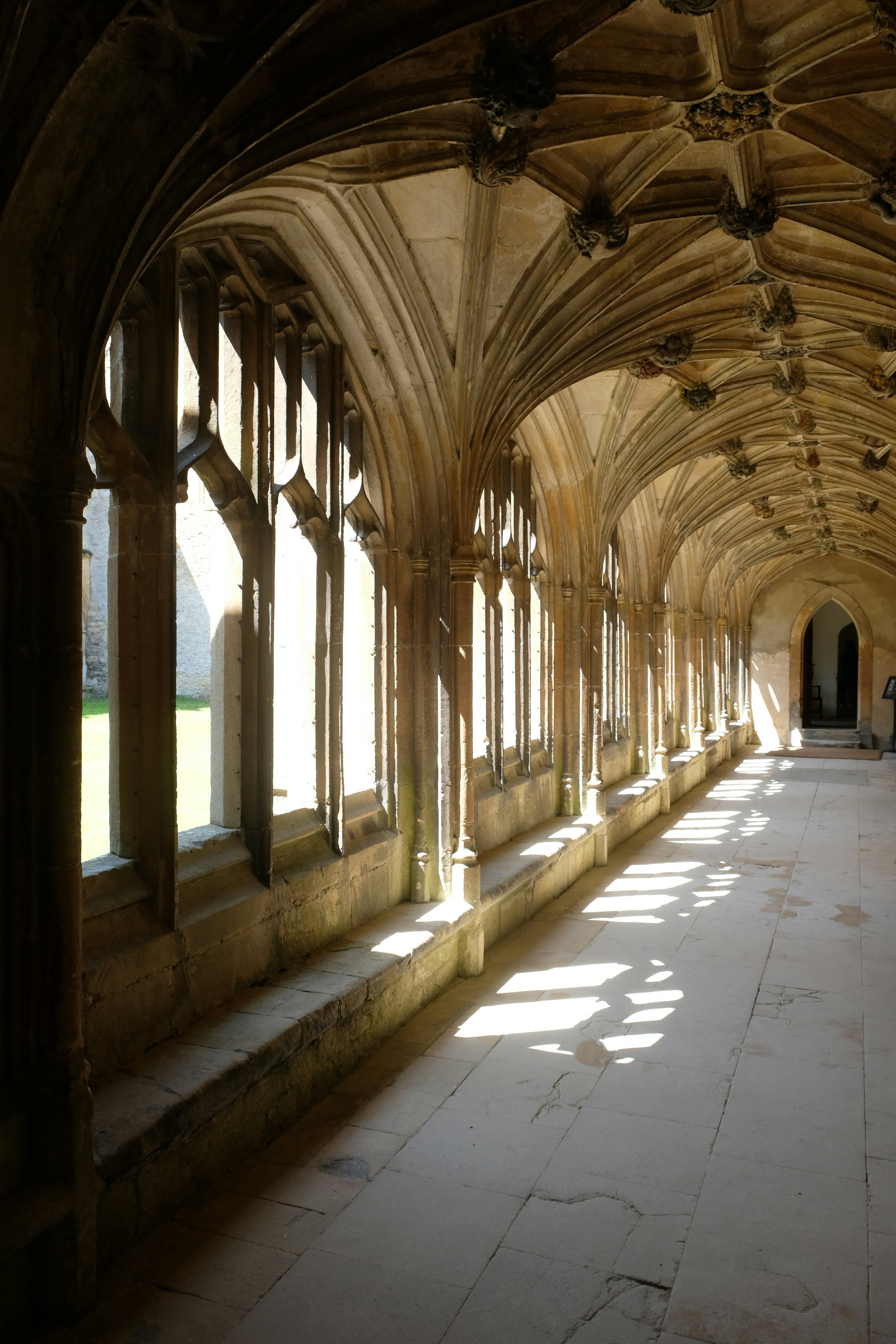 Sunlit Cloister Vaults: Echoes of Stone and Shadow