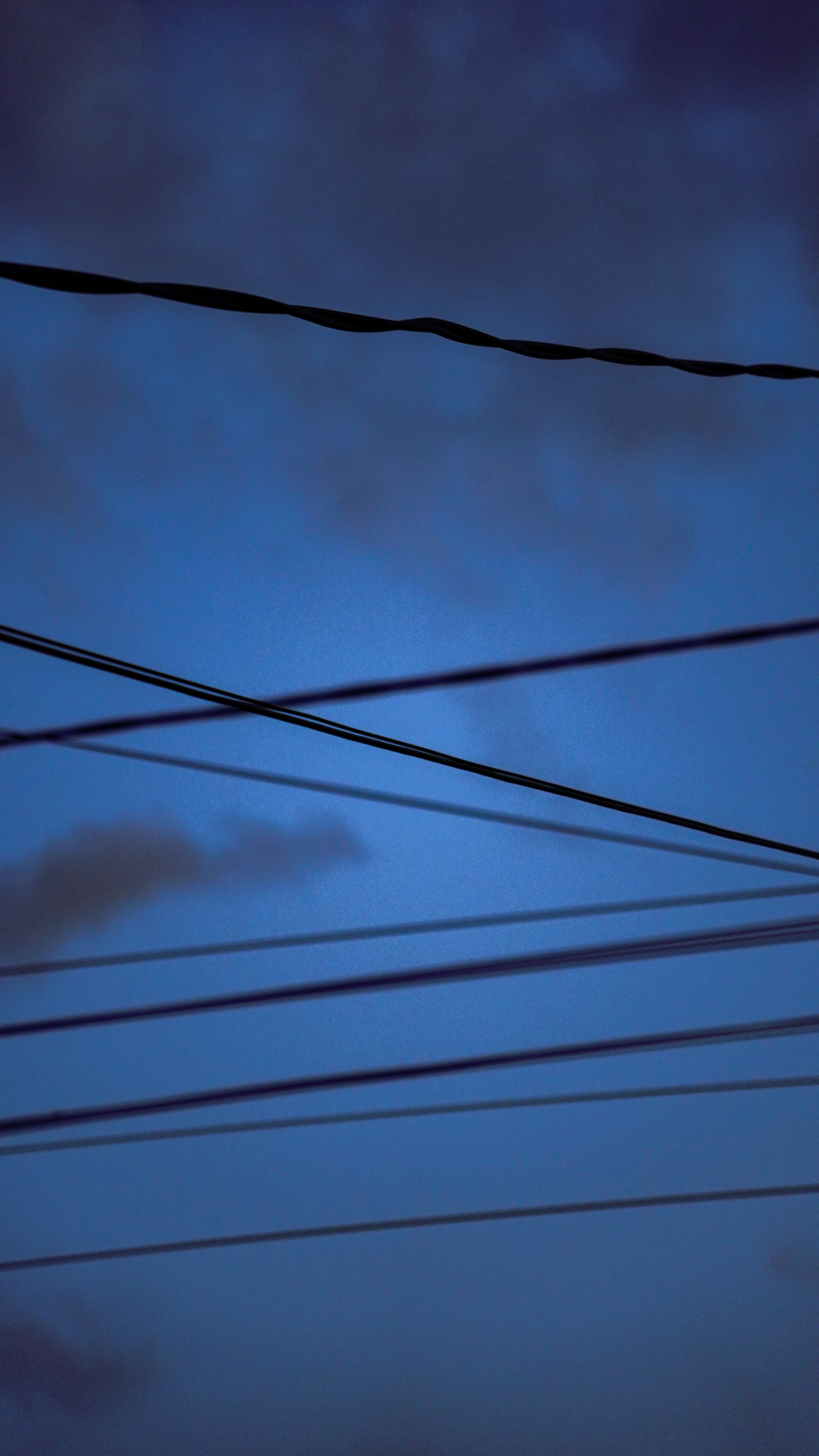 Overhead Wires at Dusk: A Quiet Skyline Cadence