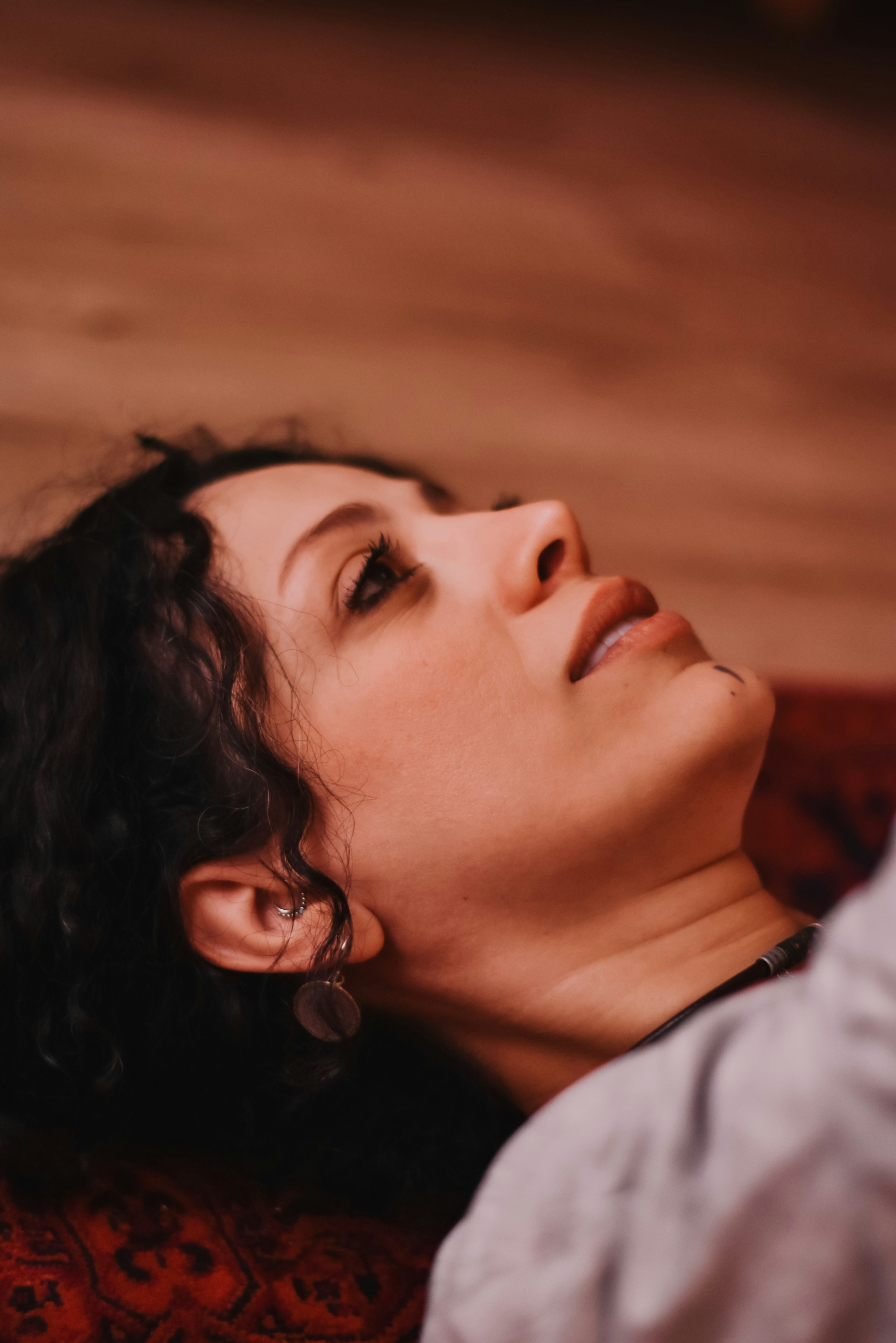 Portrait Repose: A Quiet Moment of Contemplation on a Fringe of Warm Light