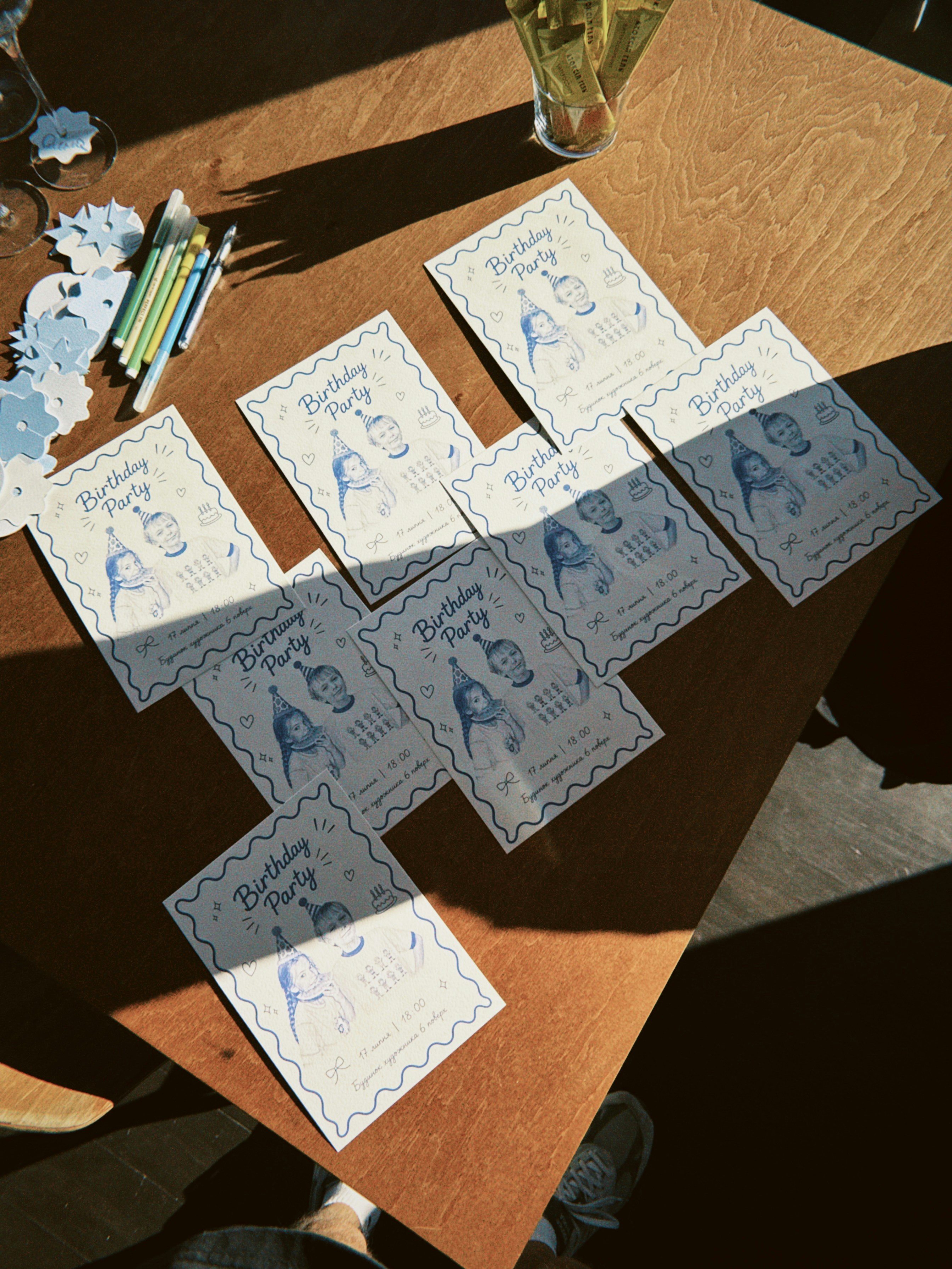 Birthday Bonnets: Cards Spread Across a Sunlit Table