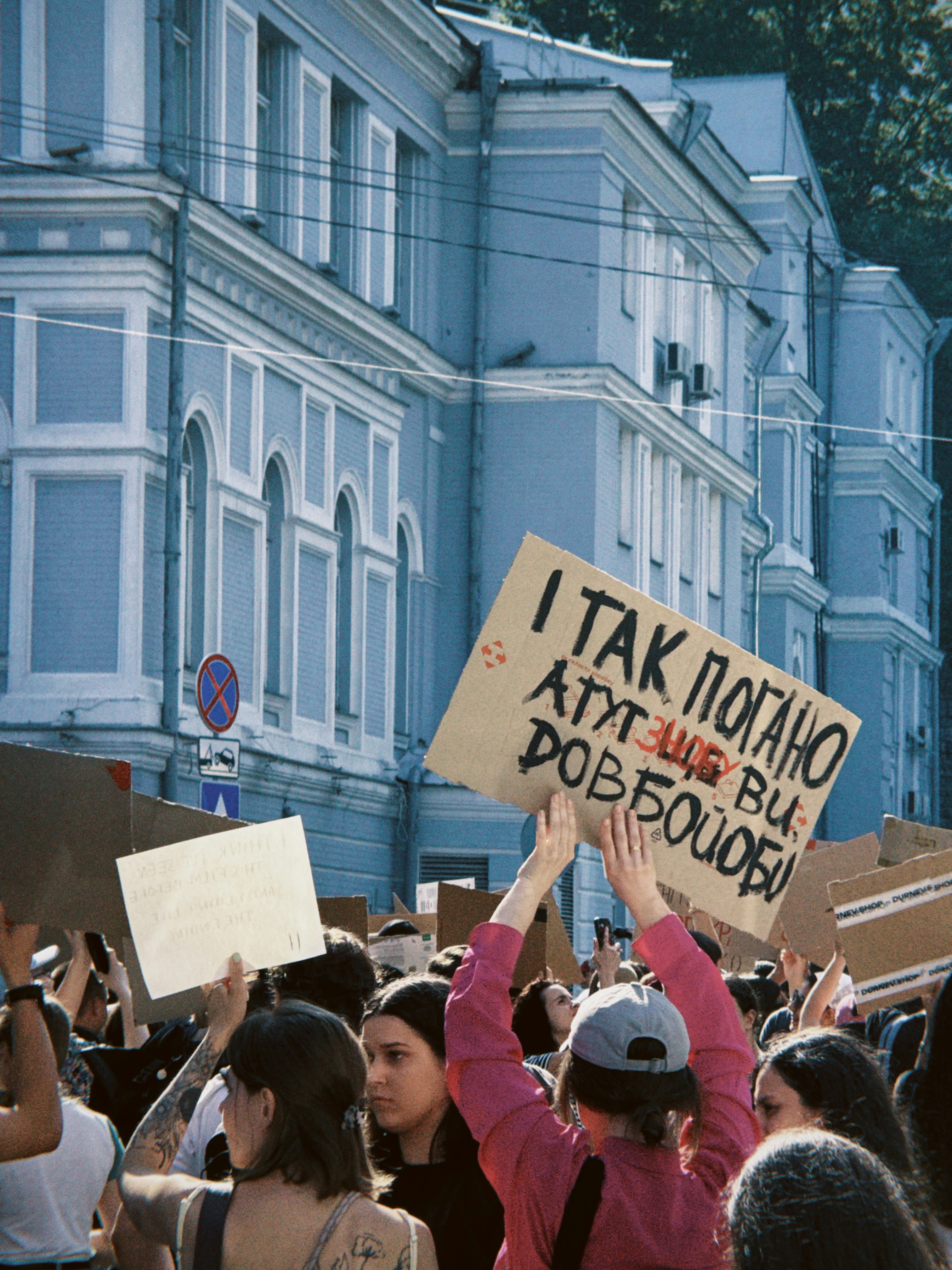 Hands Up and Sign High: A Protest Banner Draws the Crowd