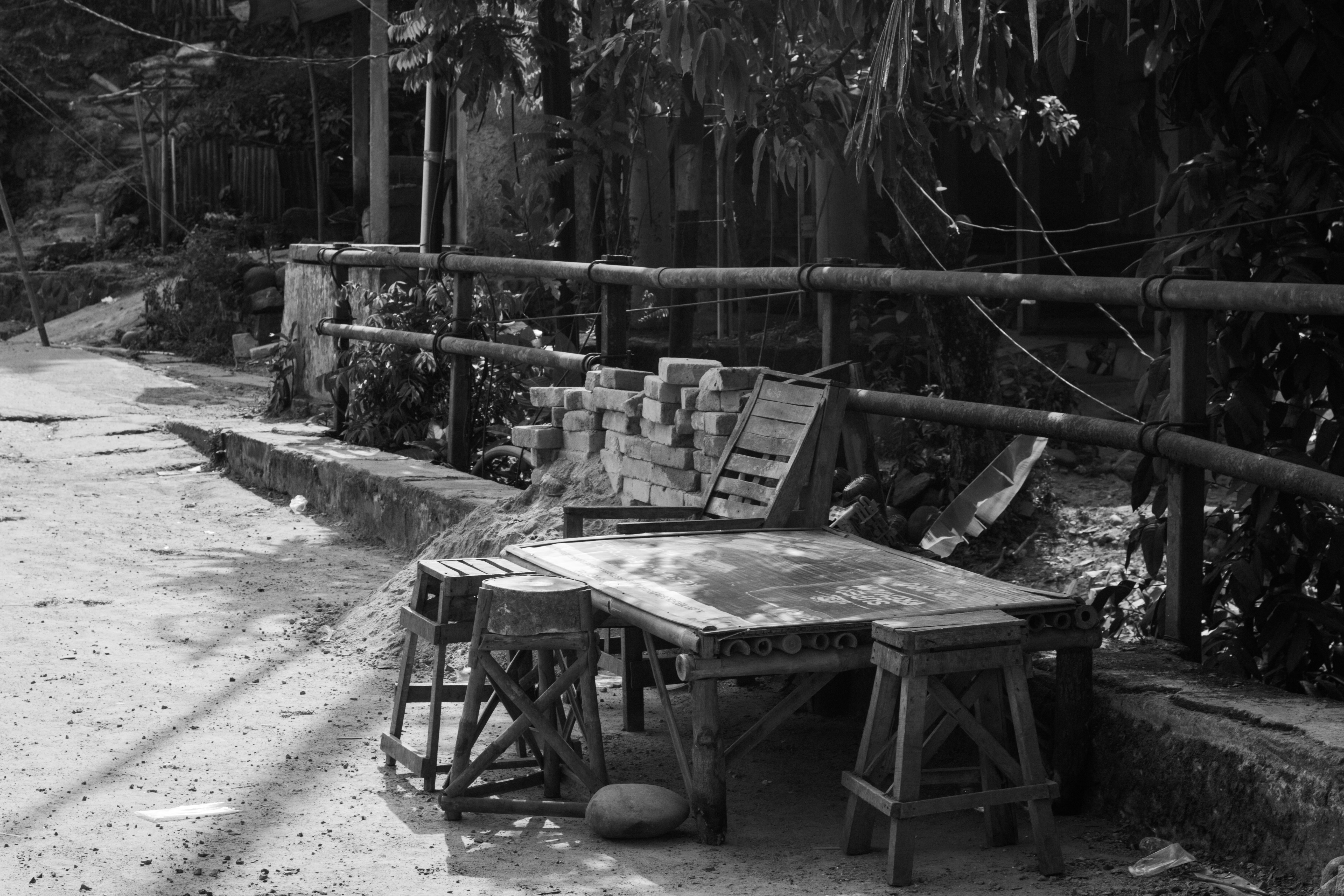 Workbench in Quiet Orchard: A Quiet Moment of Craft and Debris