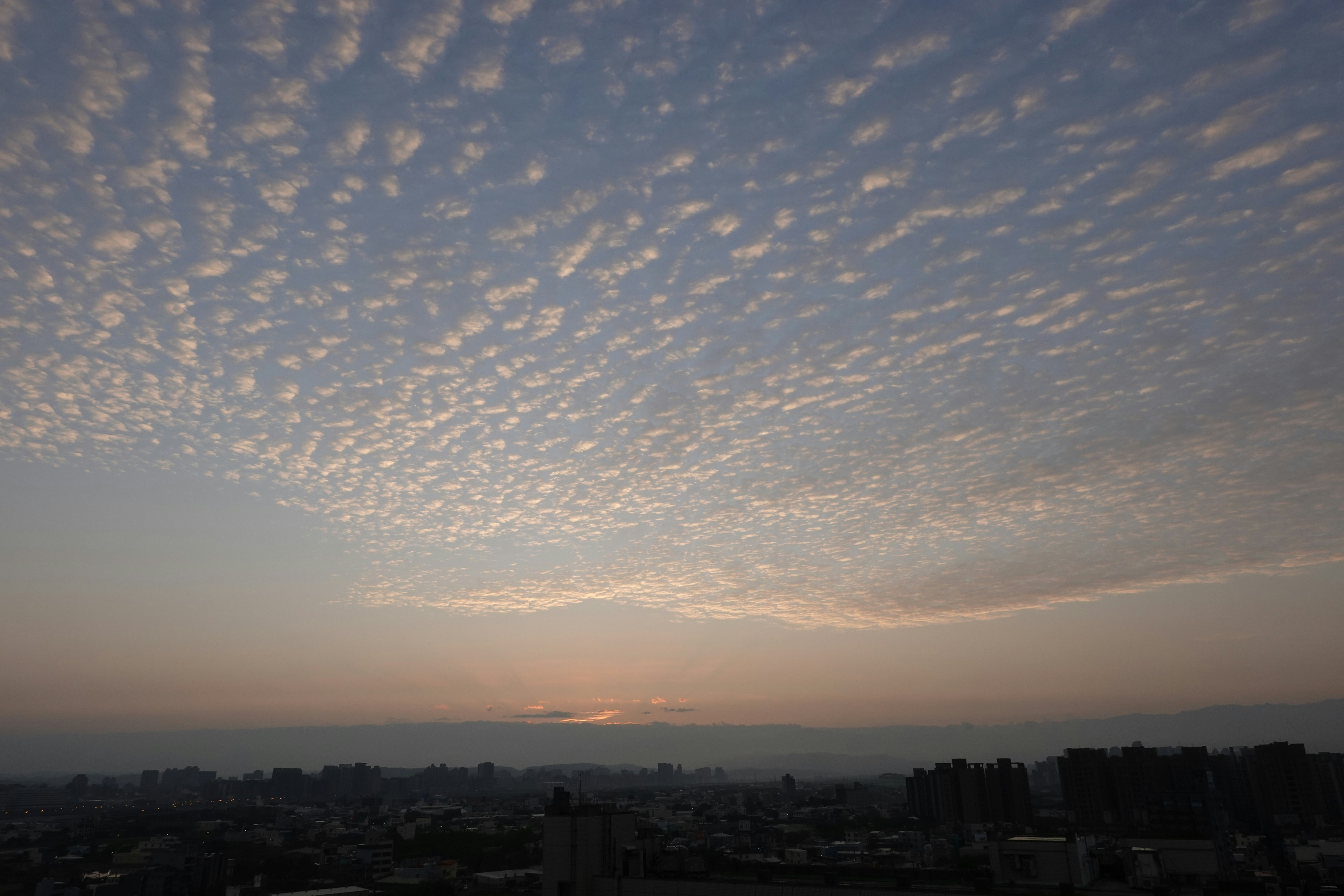 Dawn Break over the City: A Quiet Horizon Meeting the Rising Sun