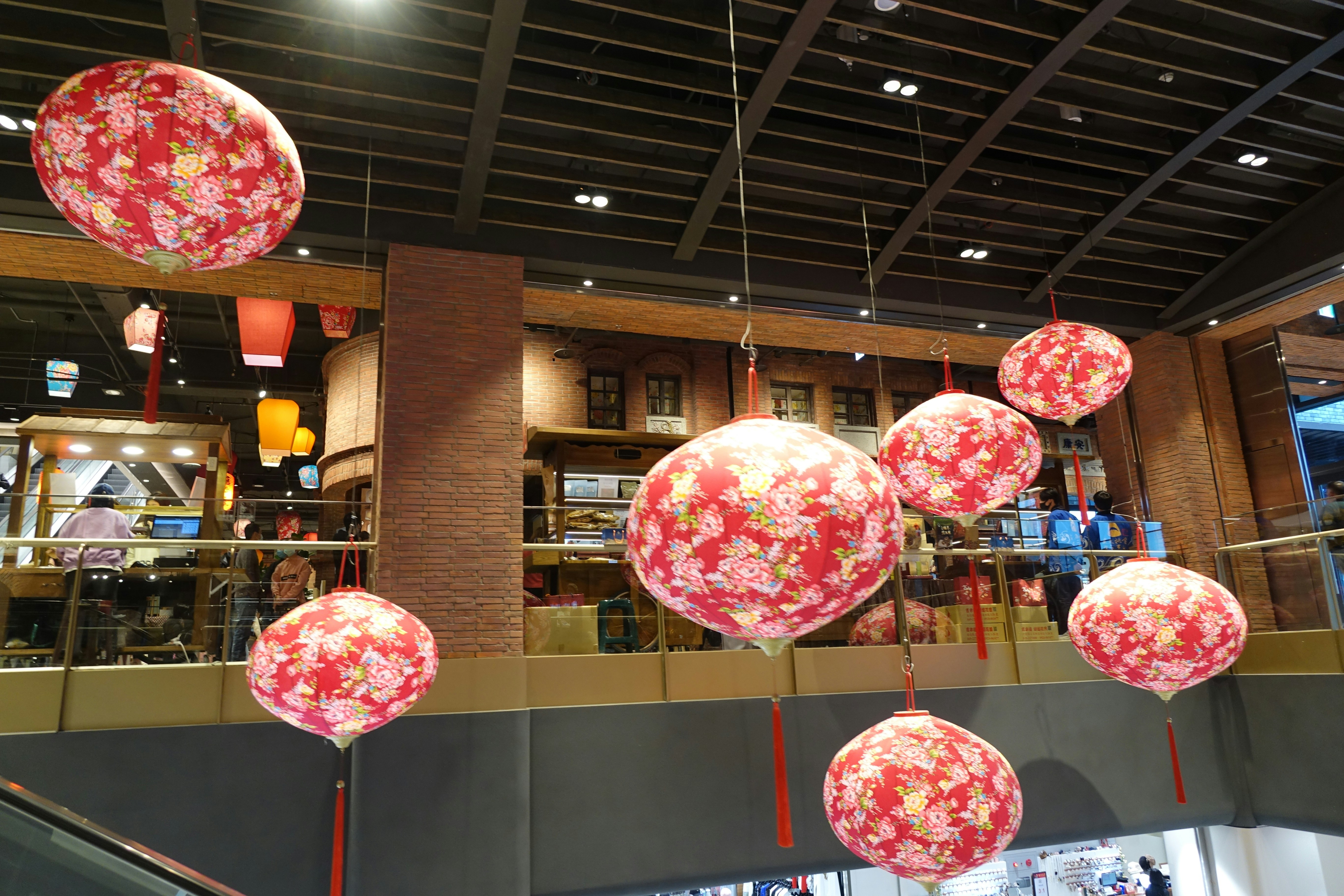Floating Lanterns Over a Modern Atrium