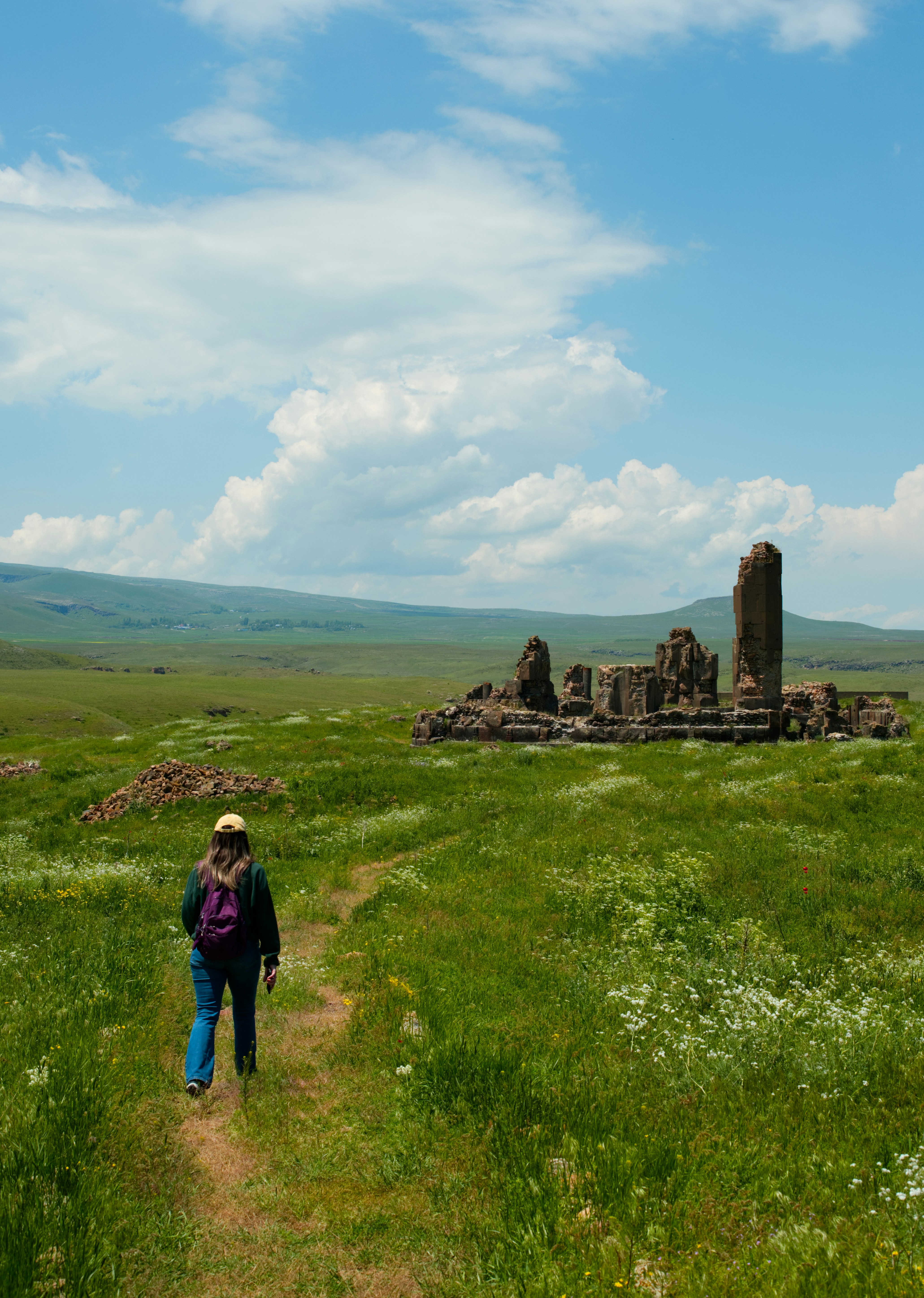 Traveler Toward Ruins: A Quiet March Across Open Plains