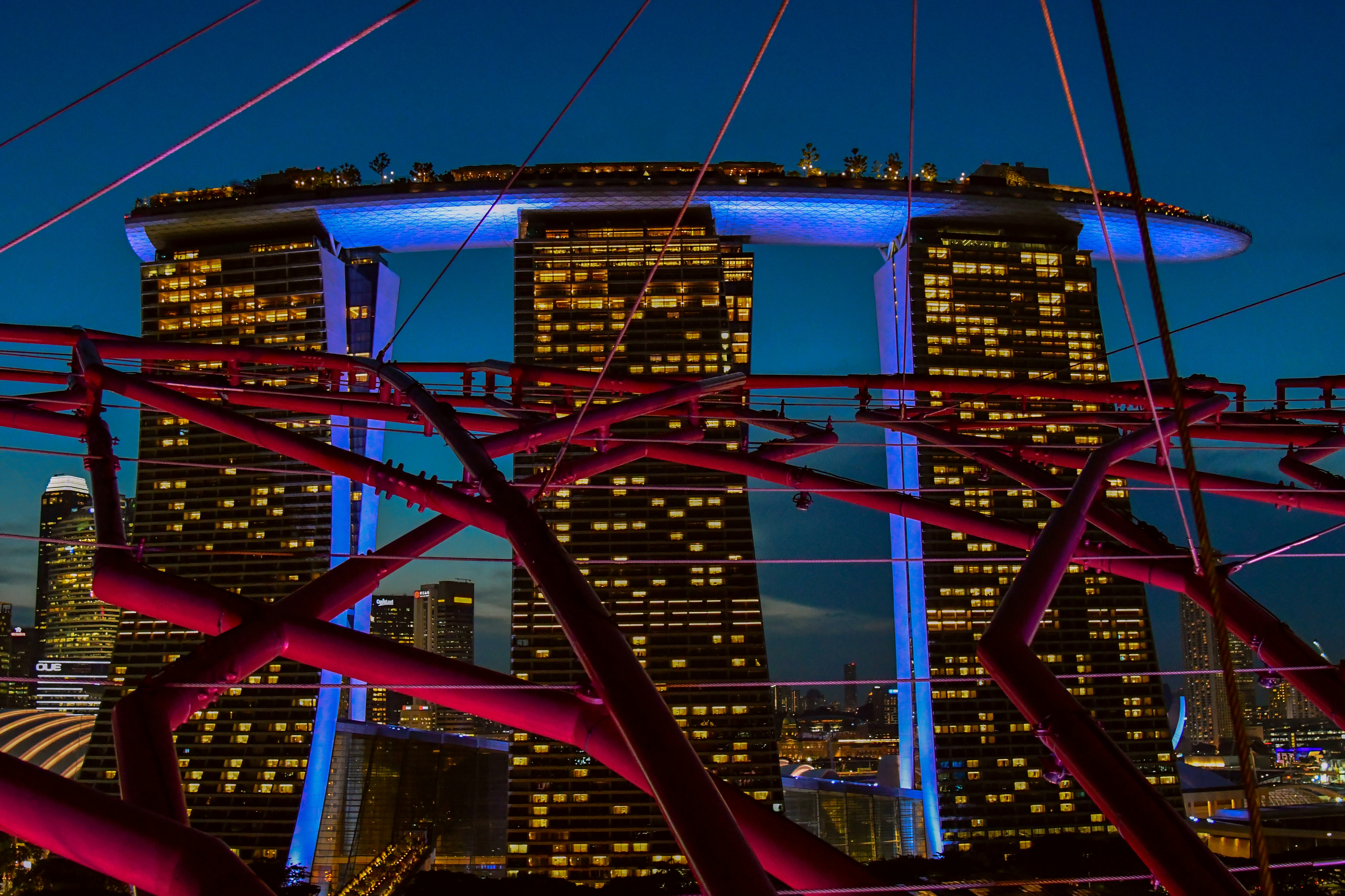Skyframe at Dawn: City Lights Framed by the Helix Walkway