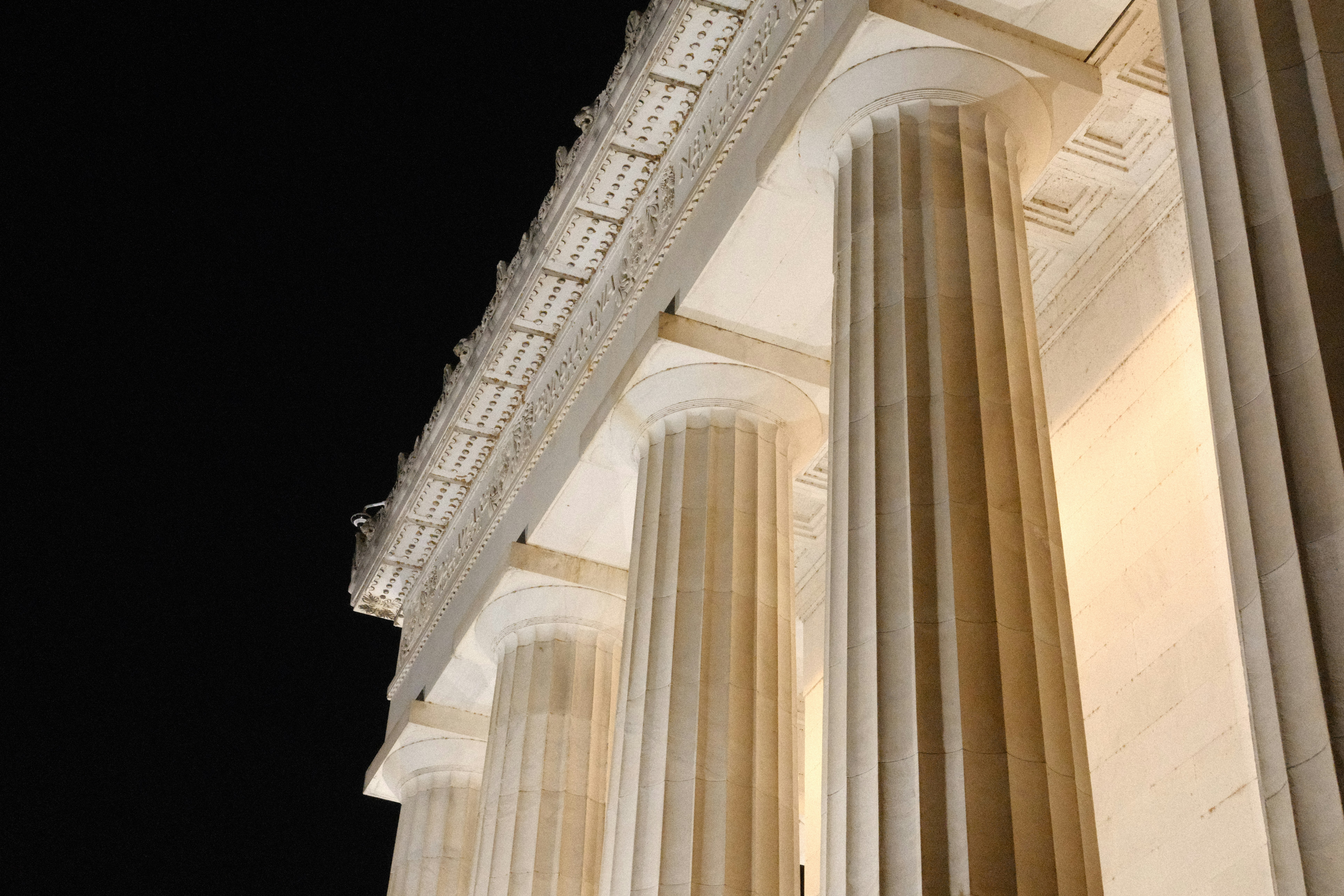 Granite Columns at Night: Echoes of a Classical Facade
