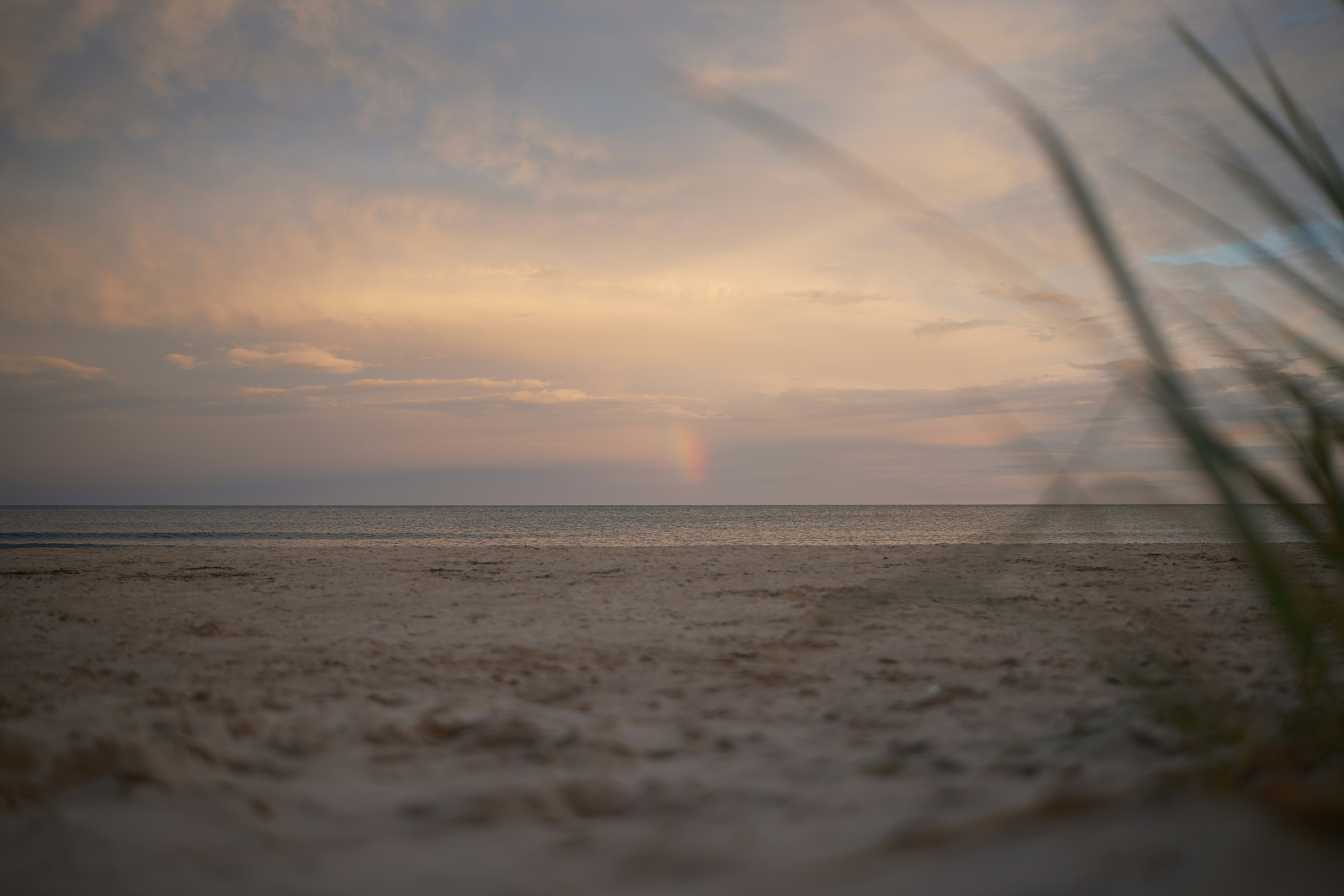 Quiet Horizon: Sunset on a Quiet Beach