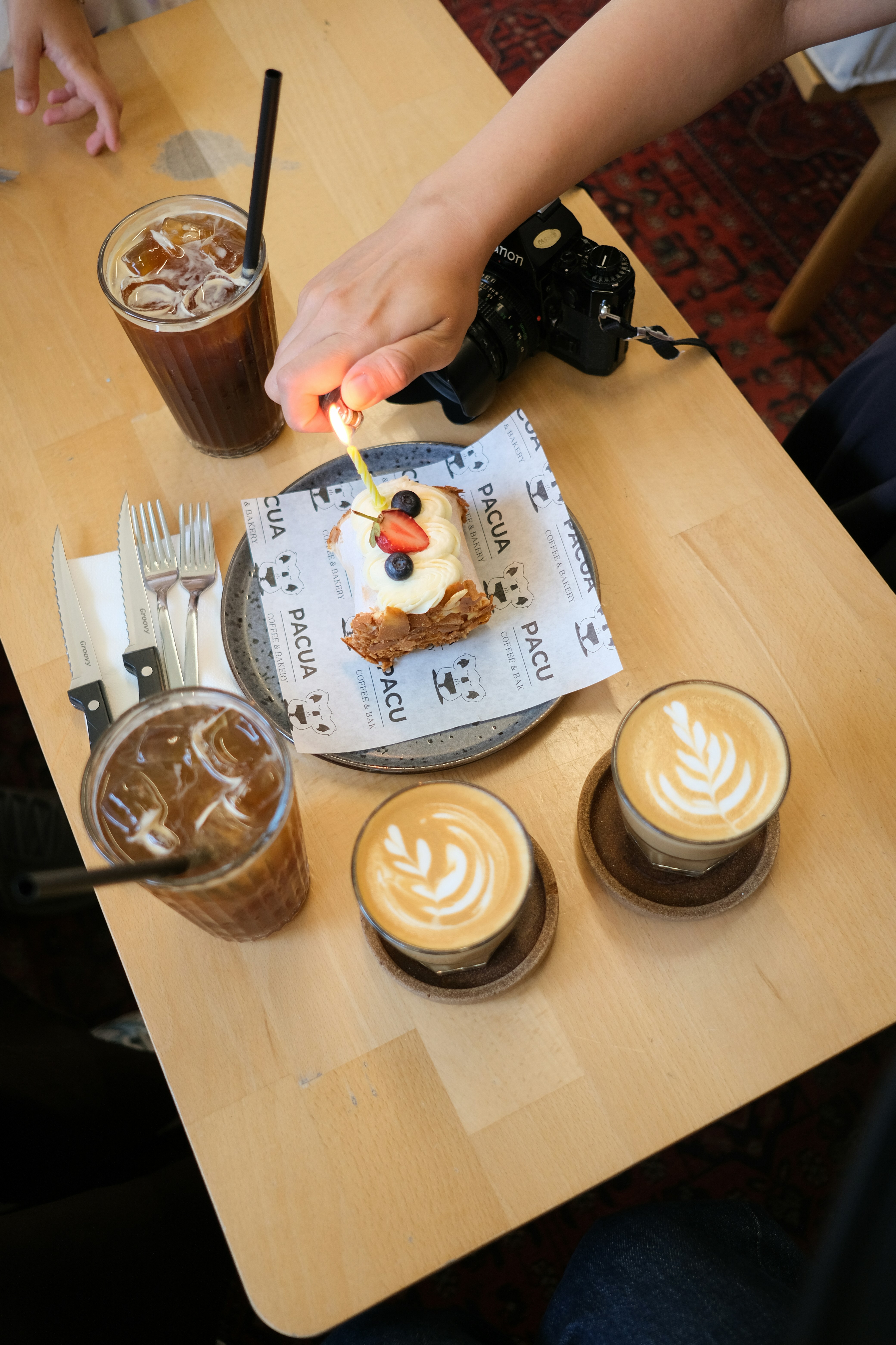 Slice of Celebration: A Plateful of Coffee and Cake at Close Range