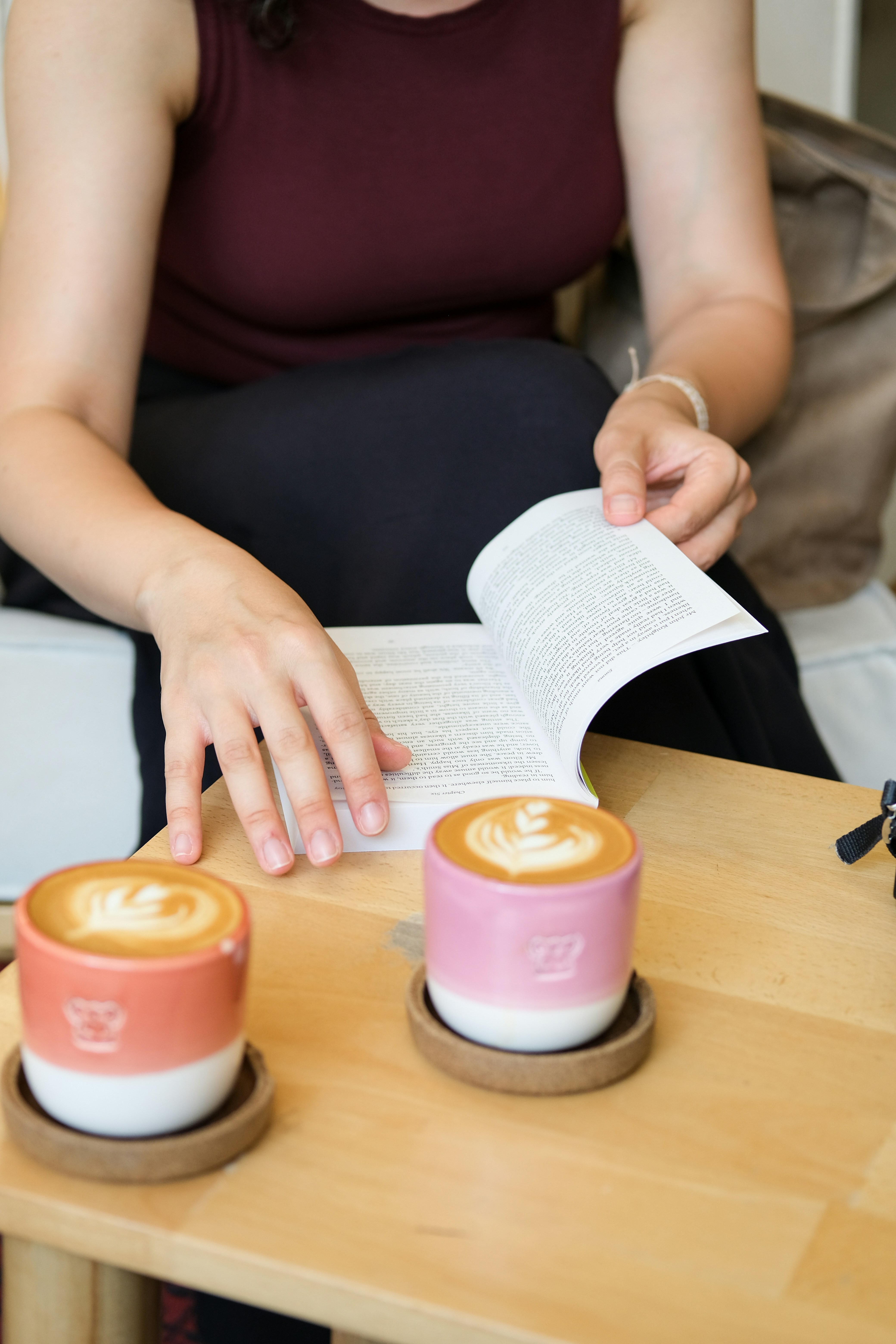 Tea Break and a Page Turn: Quiet Focus at a Café Table