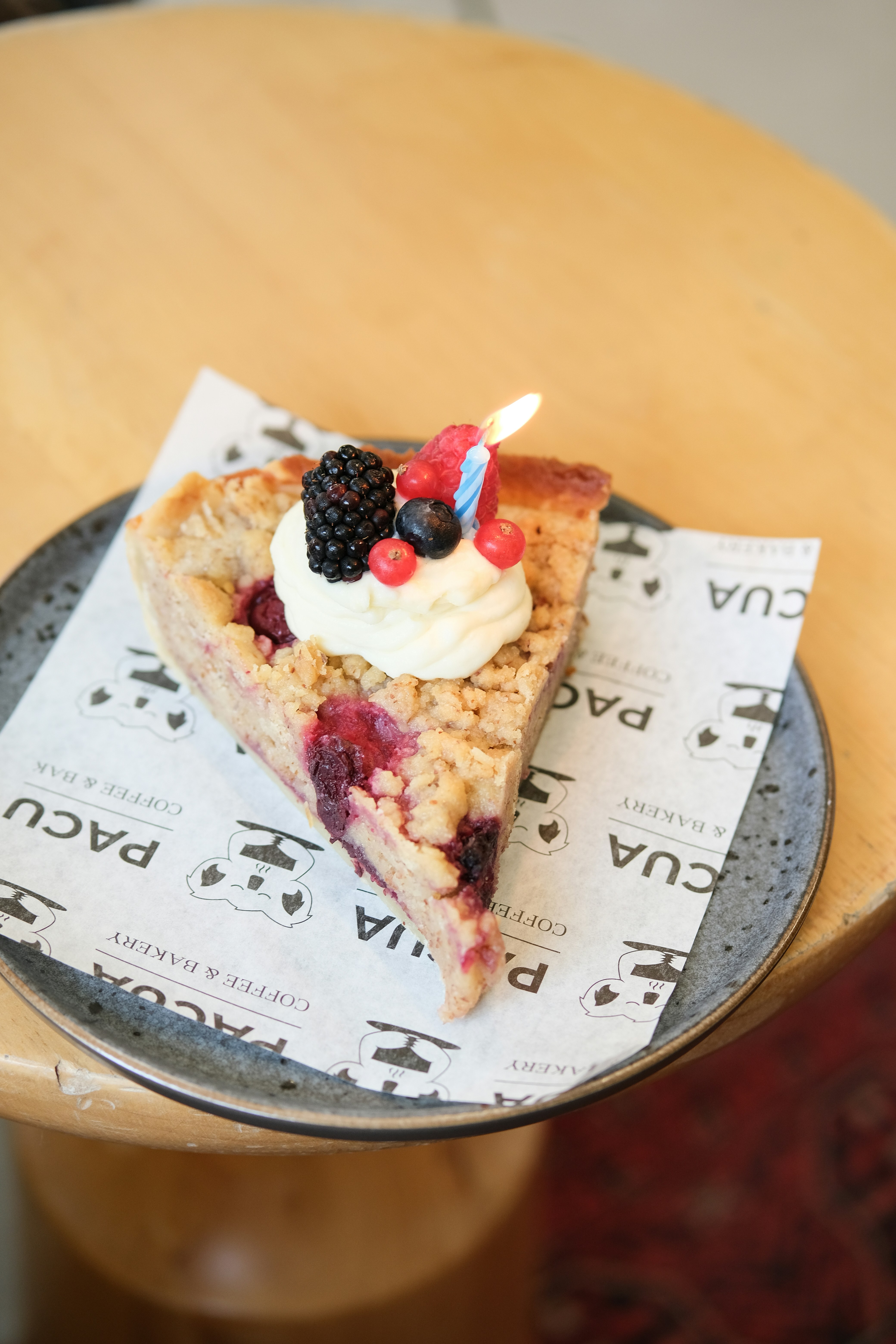 Berry-cream wedge: a toasted treasure atop a marble plate