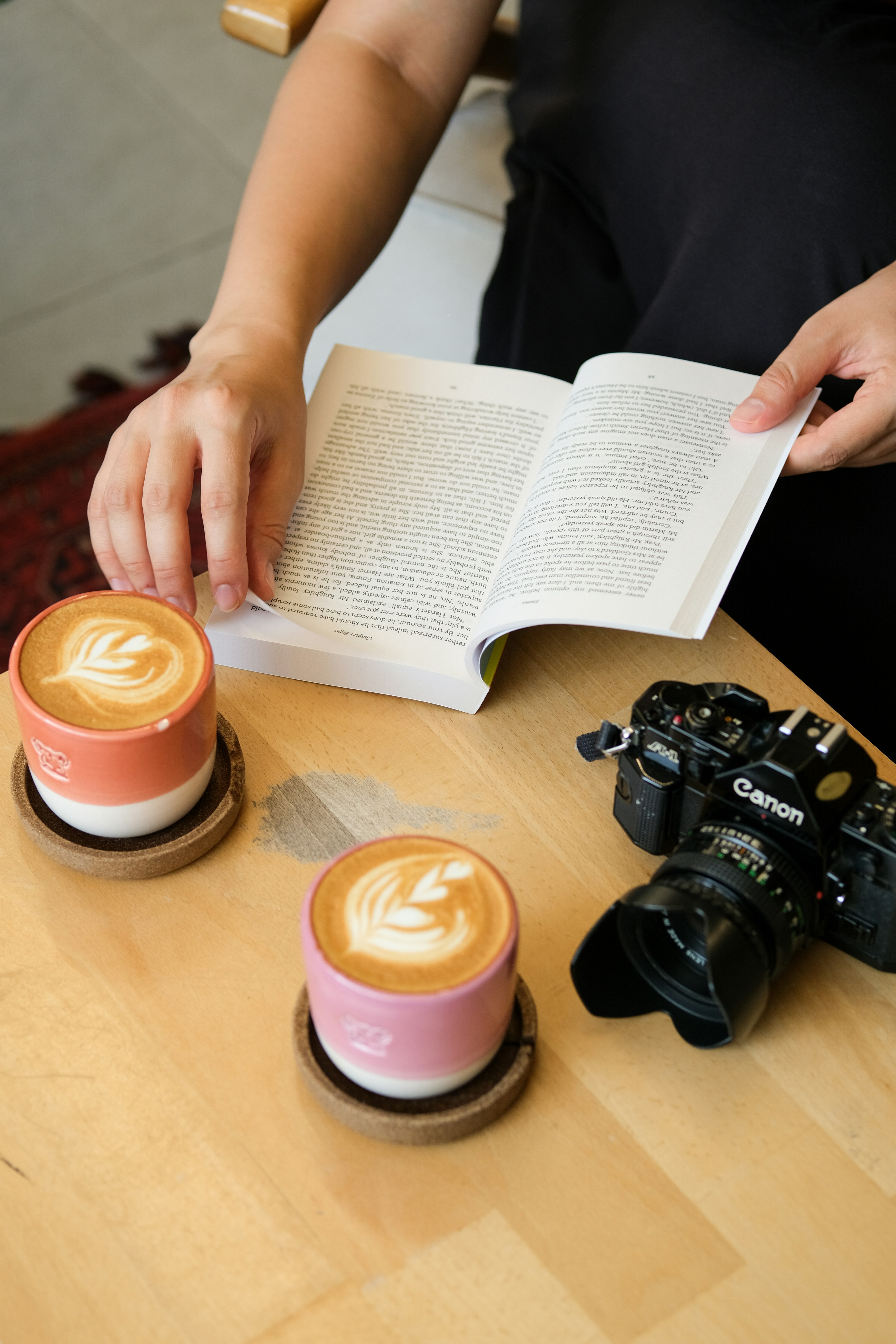 Coffee, Camera, and Pages: A Quiet Moment of Focus